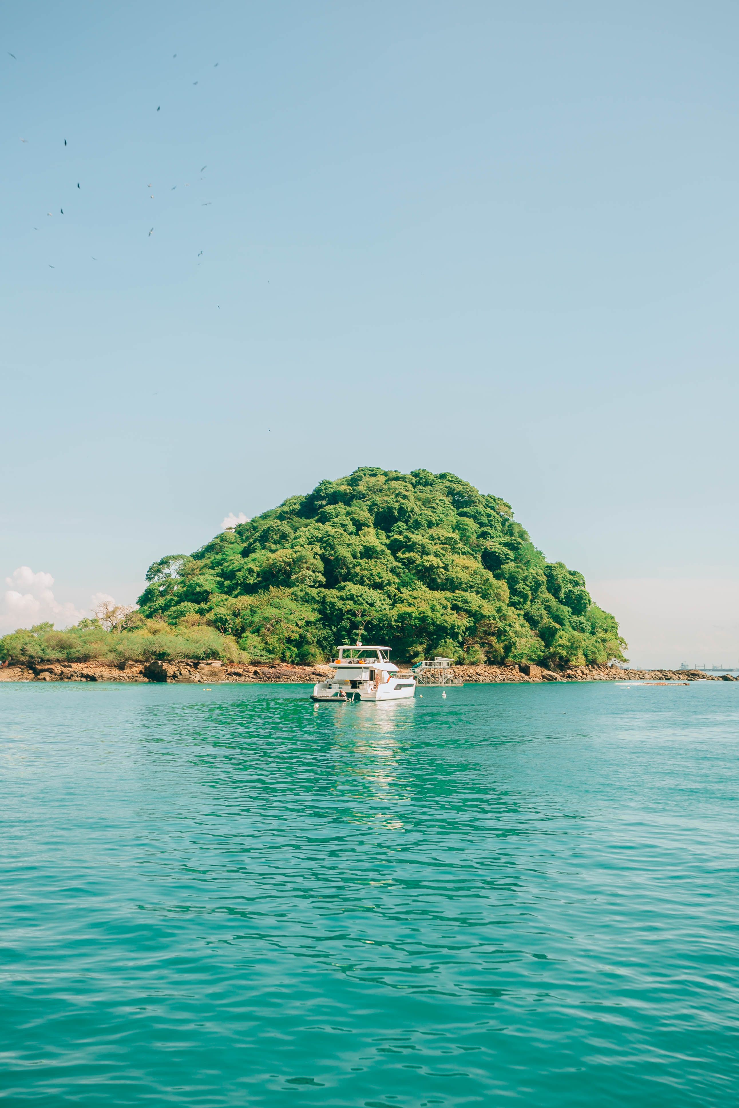 Boat Sailing towards Small Island · Free Stock Photo