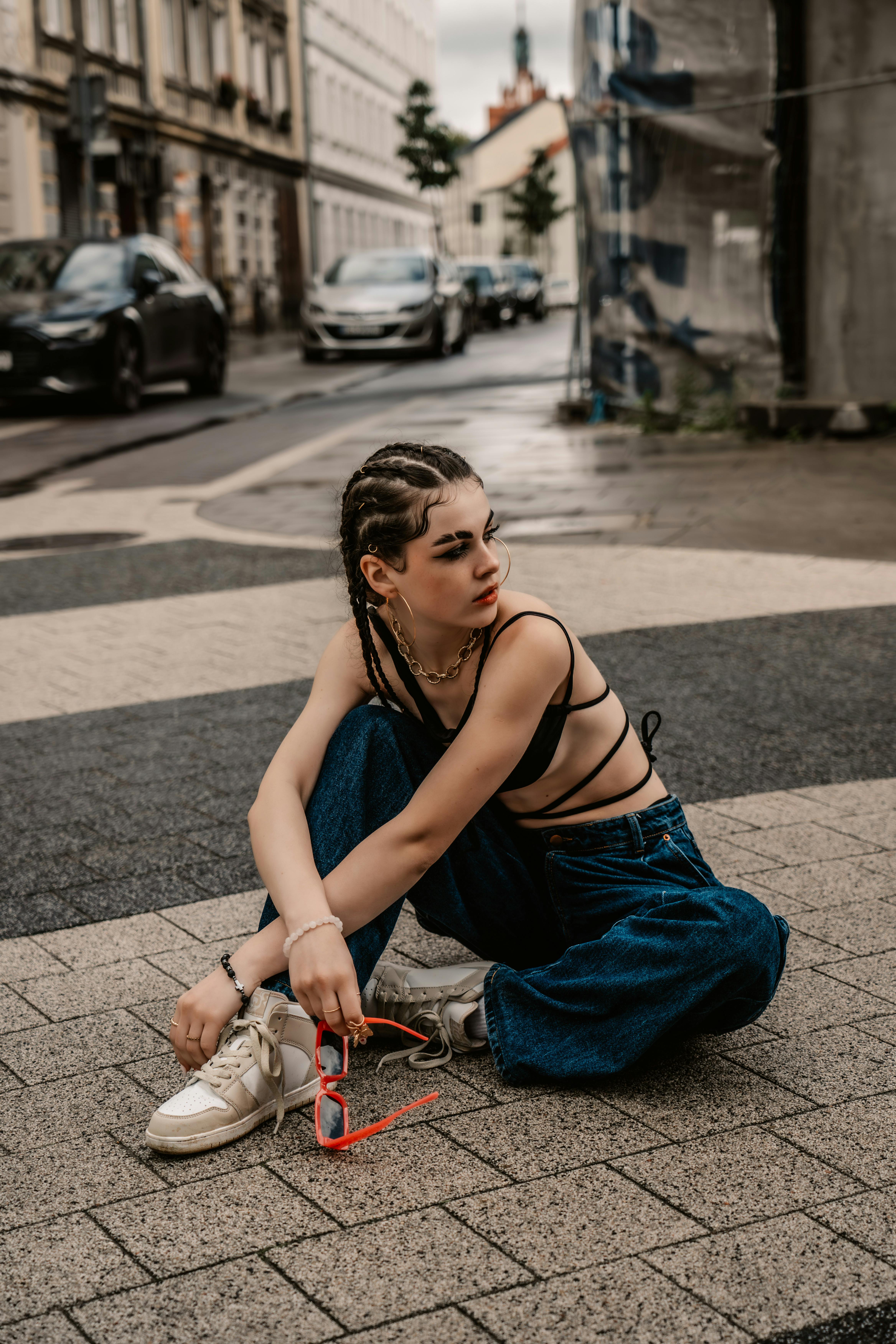 Women Sitting on the Pavement · Free Stock Photo