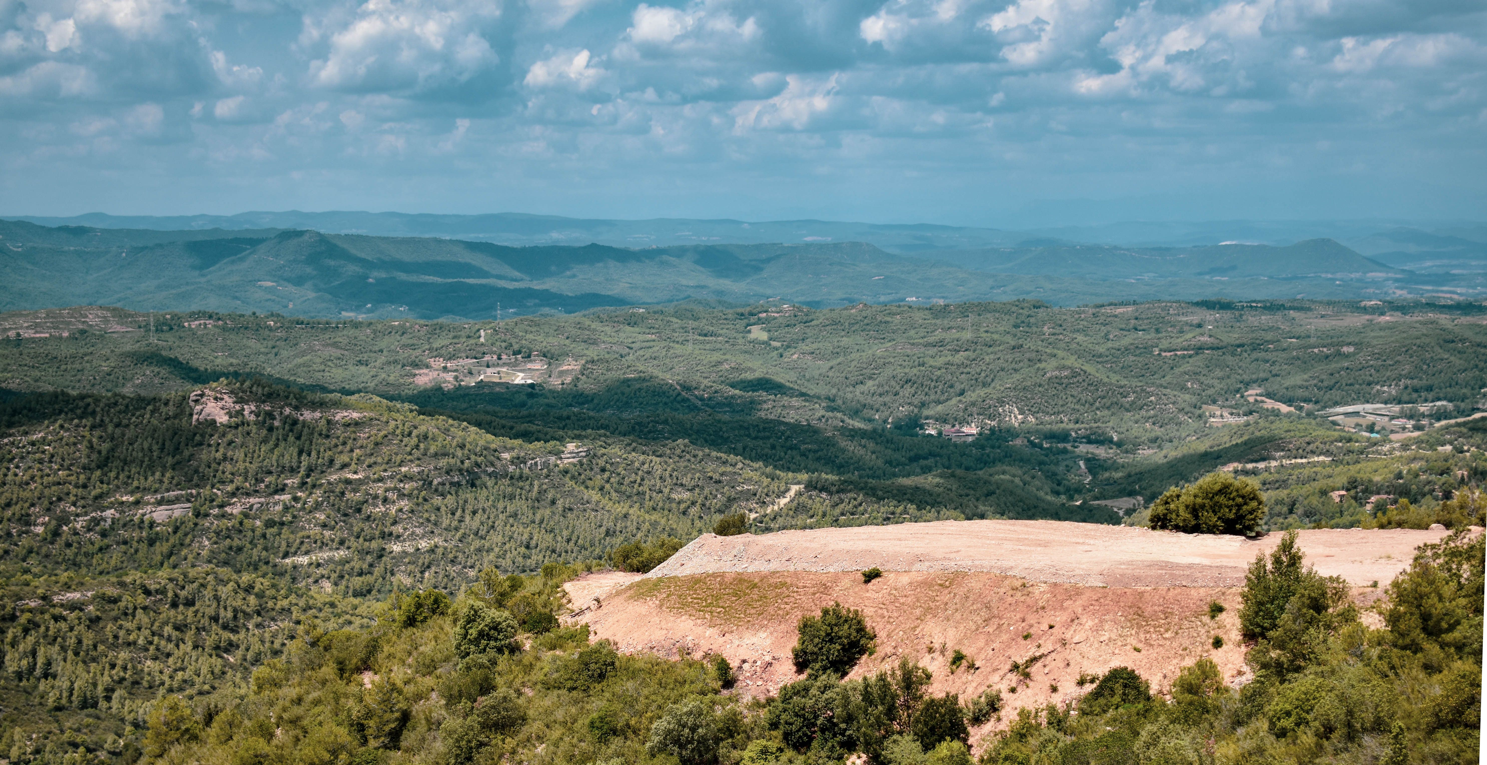 Barren Plateau Overlooking Mountain Landscape in Summer · Free Stock Photo