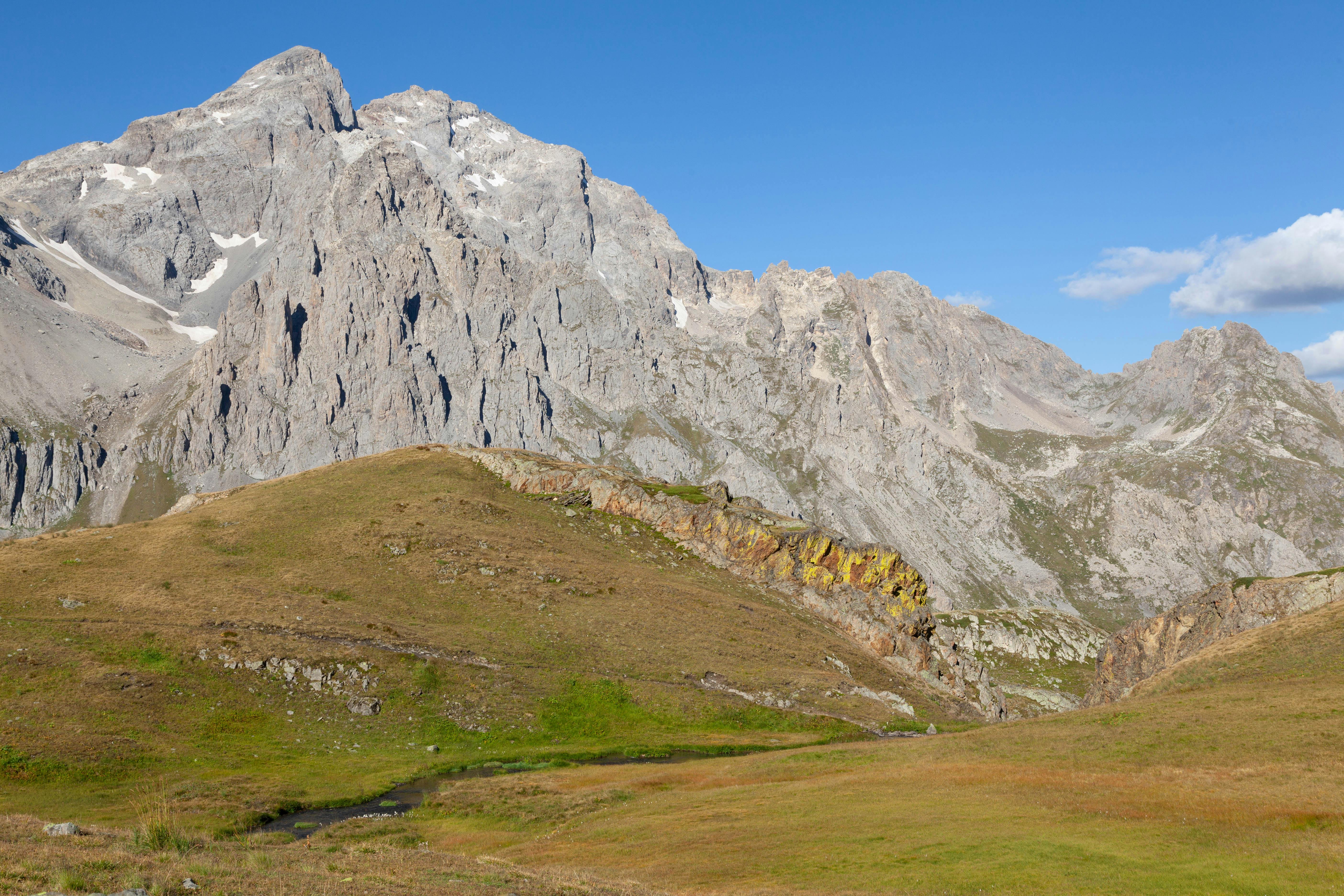 Landscape of Sunlit Mountains · Free Stock Photo