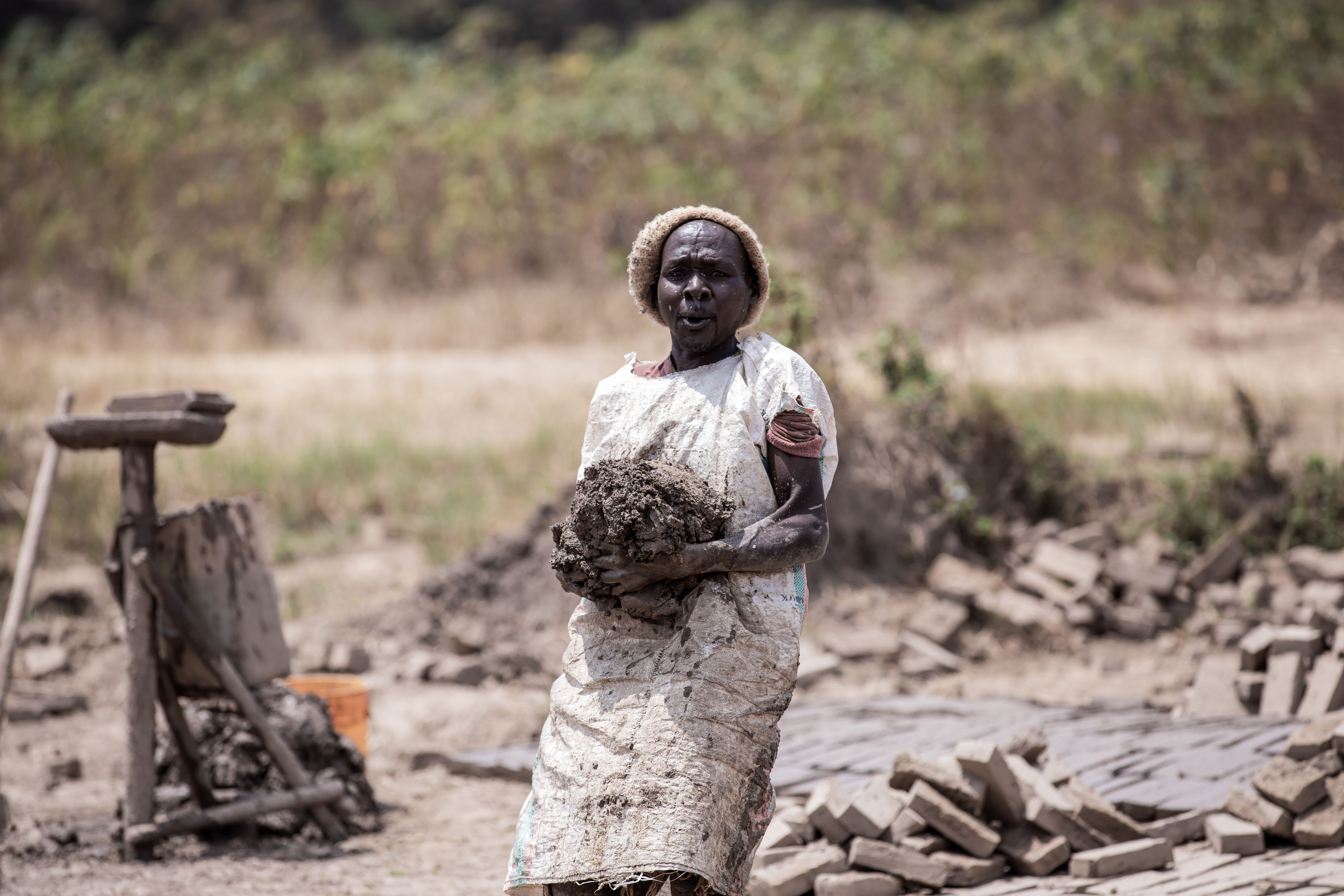 Village Woman Working in a Field · Free Stock Photo