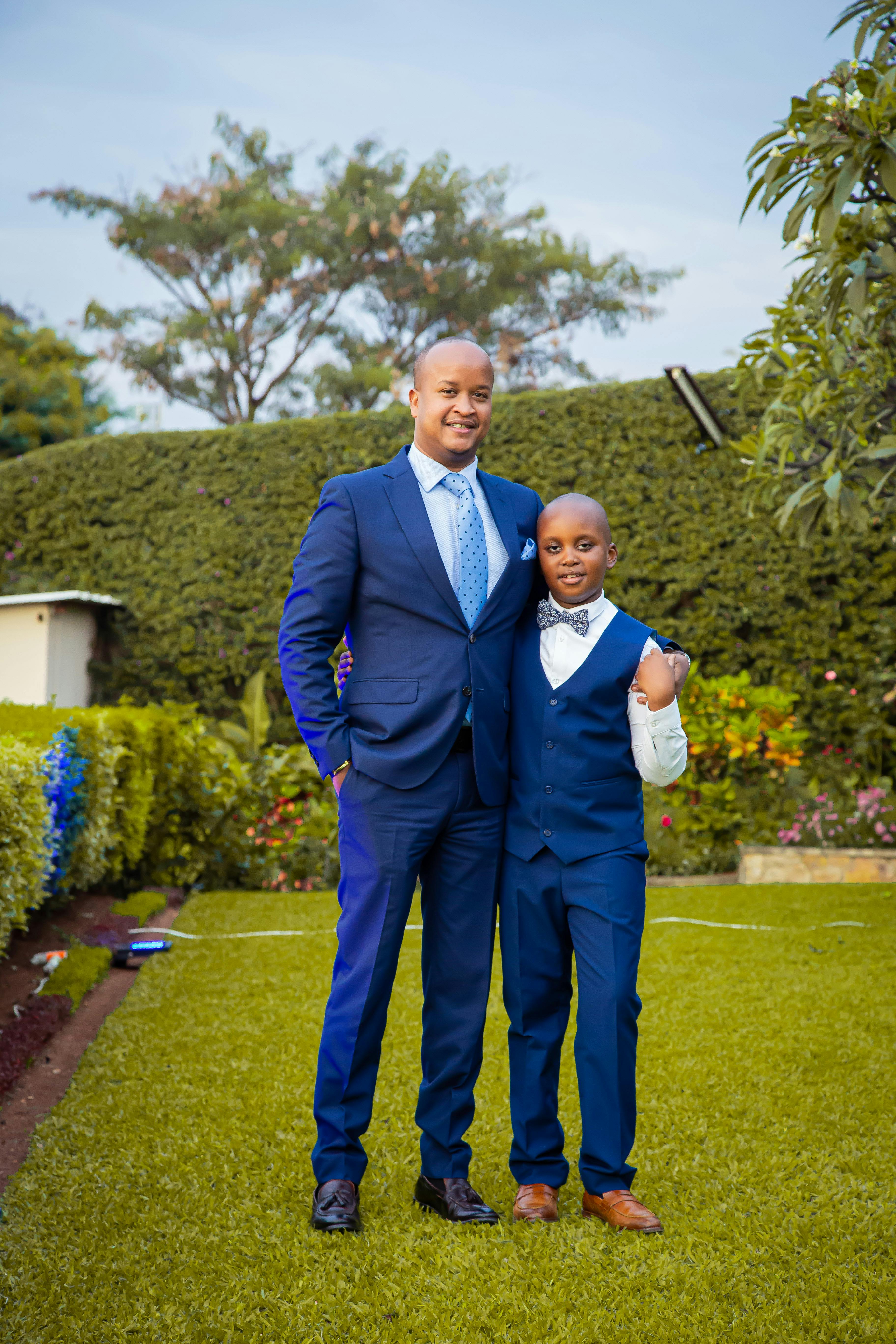 Man Carrying Boy on His Shoulder · Free Stock Photo