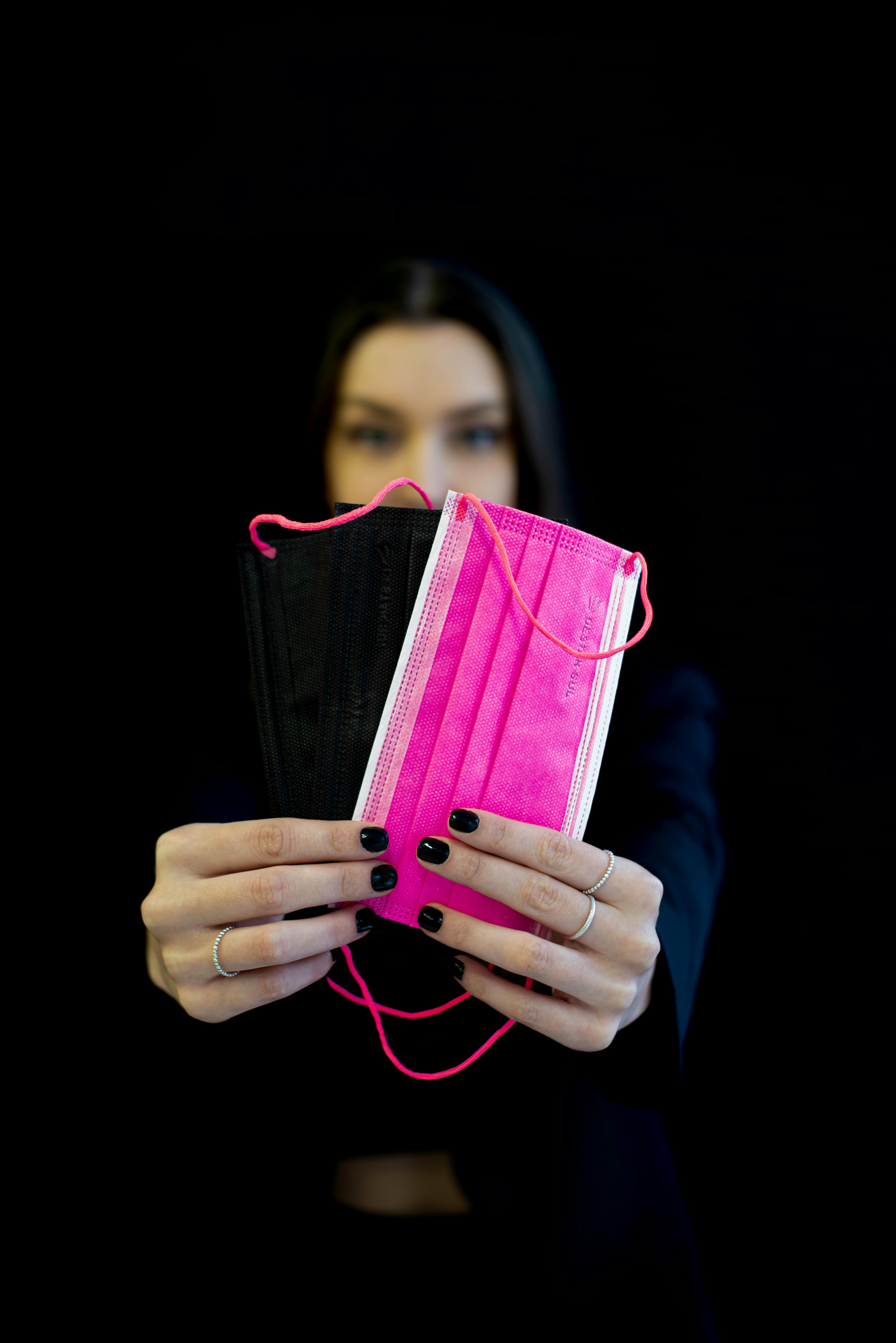 A Person Holding a Face Mask · Free Stock Photo