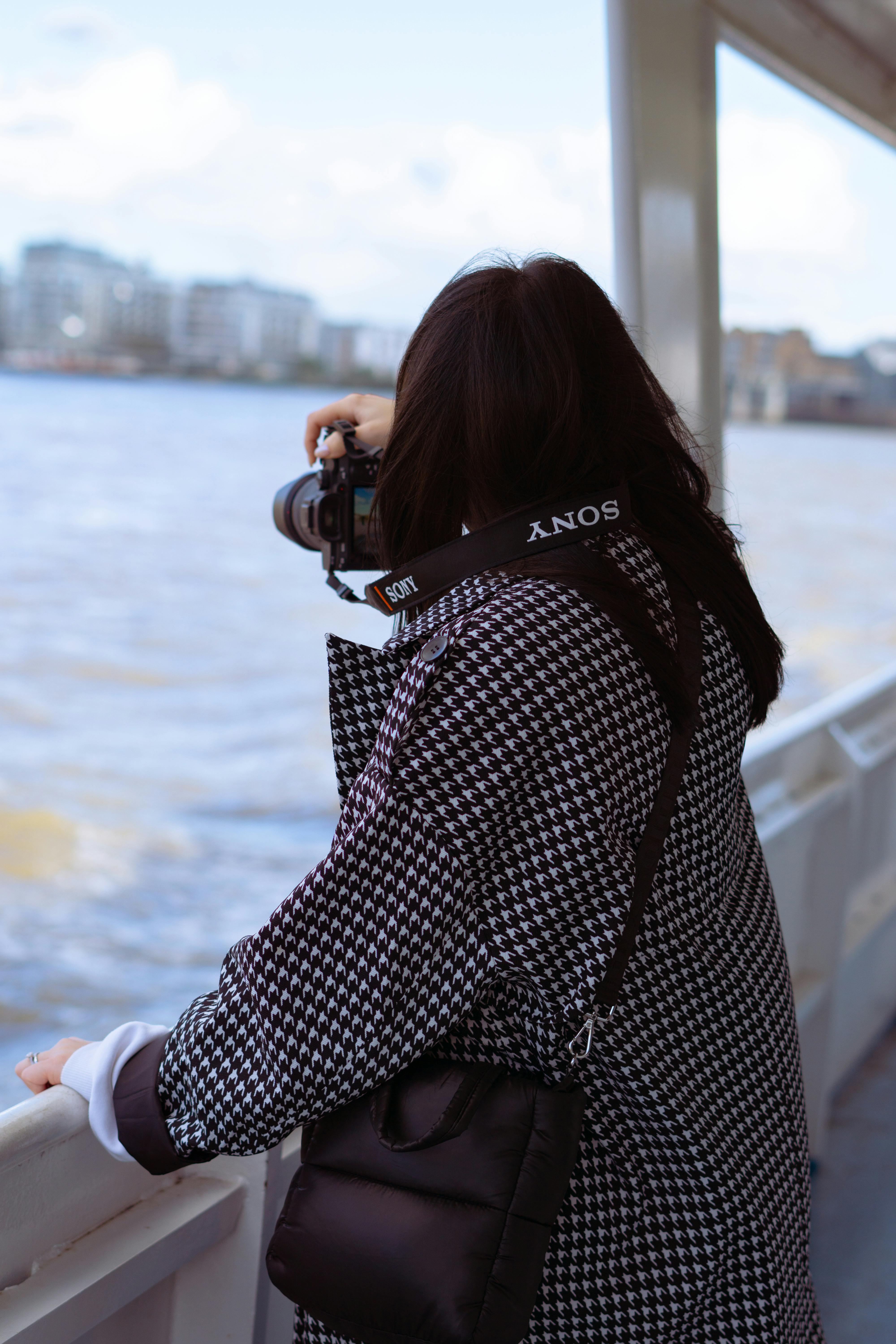 A Woman Holding a Picture · Free Stock Photo