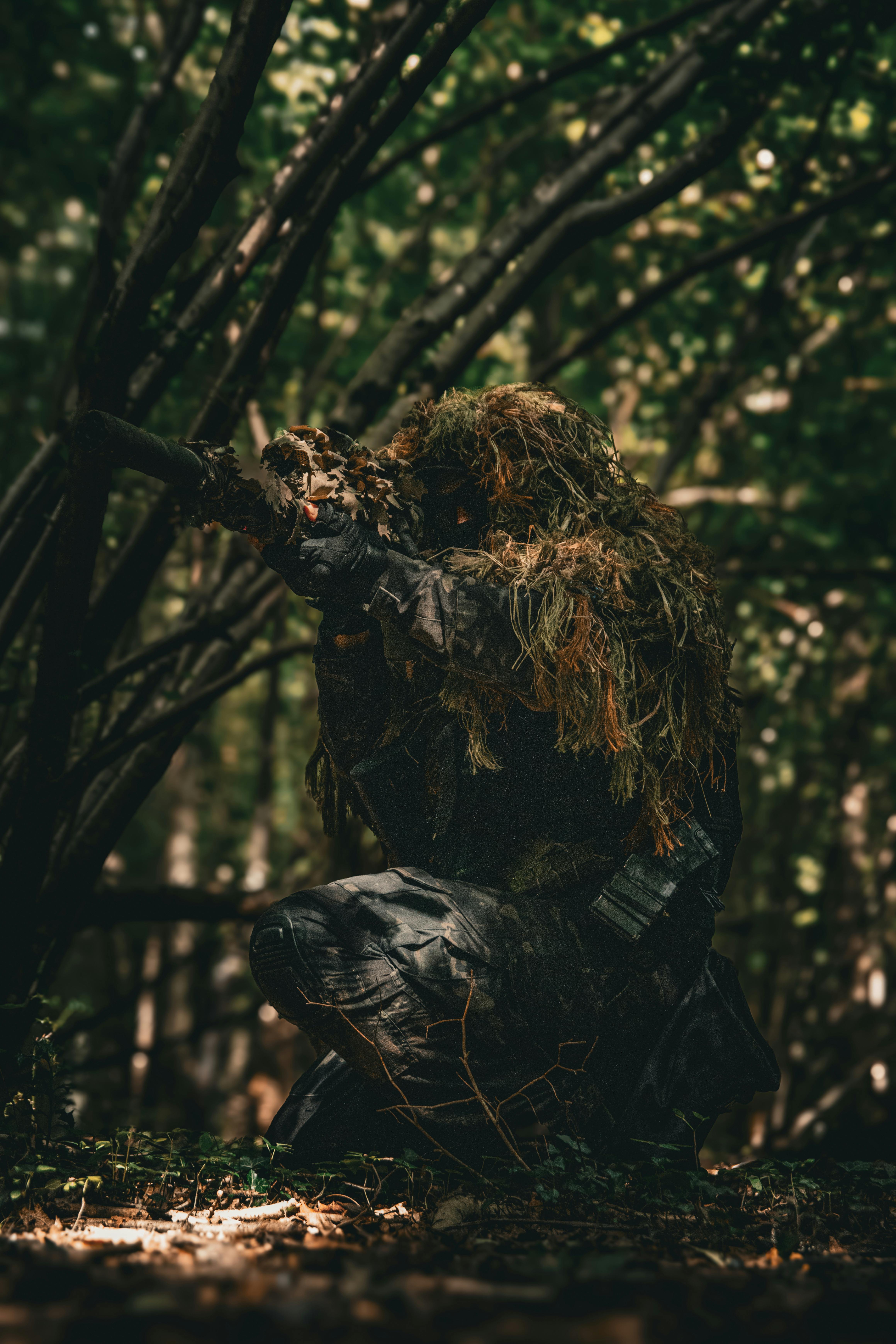 Sniper Crouching and Aiming · Free Stock Photo