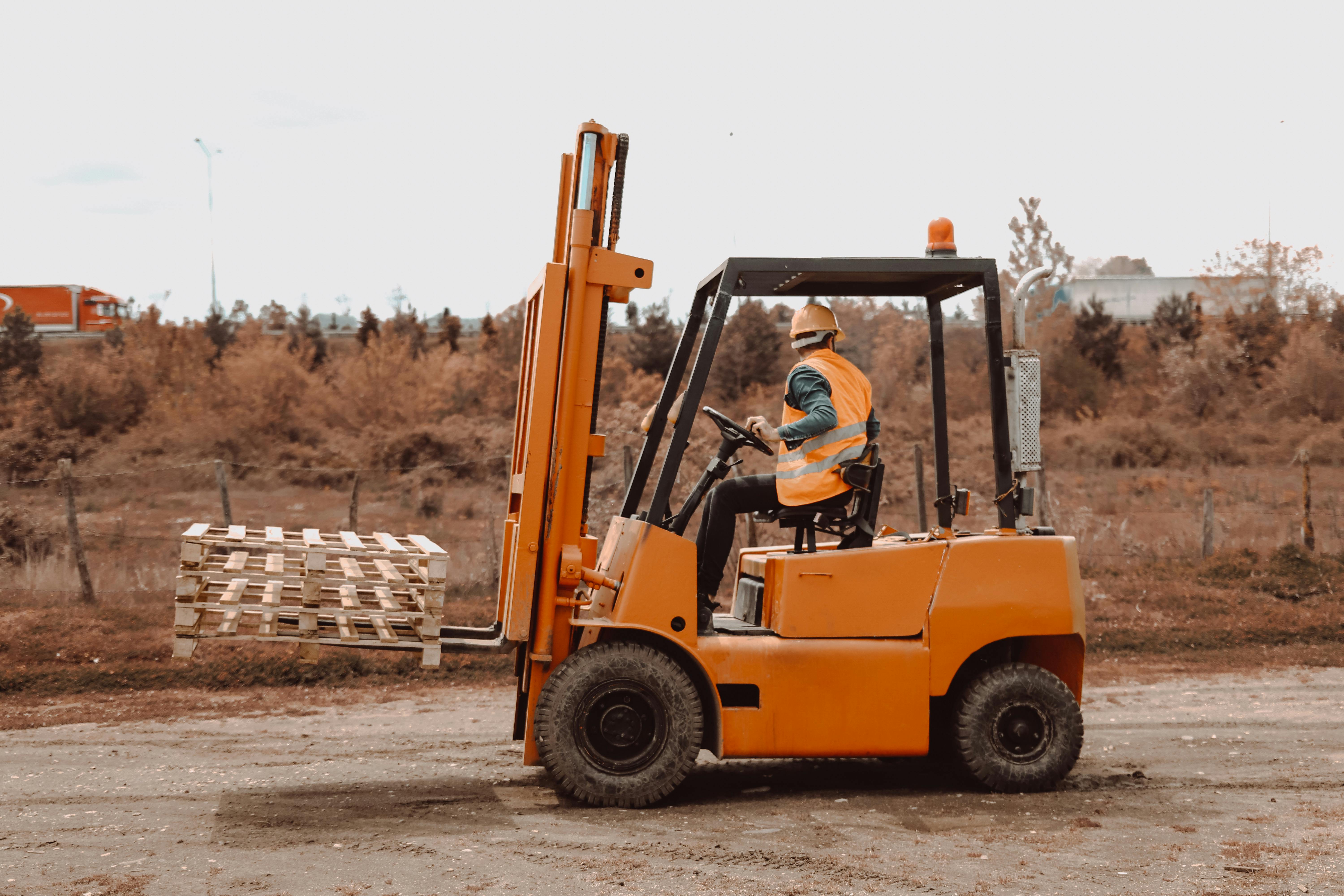 Person Using Forklift · Free Stock Photo