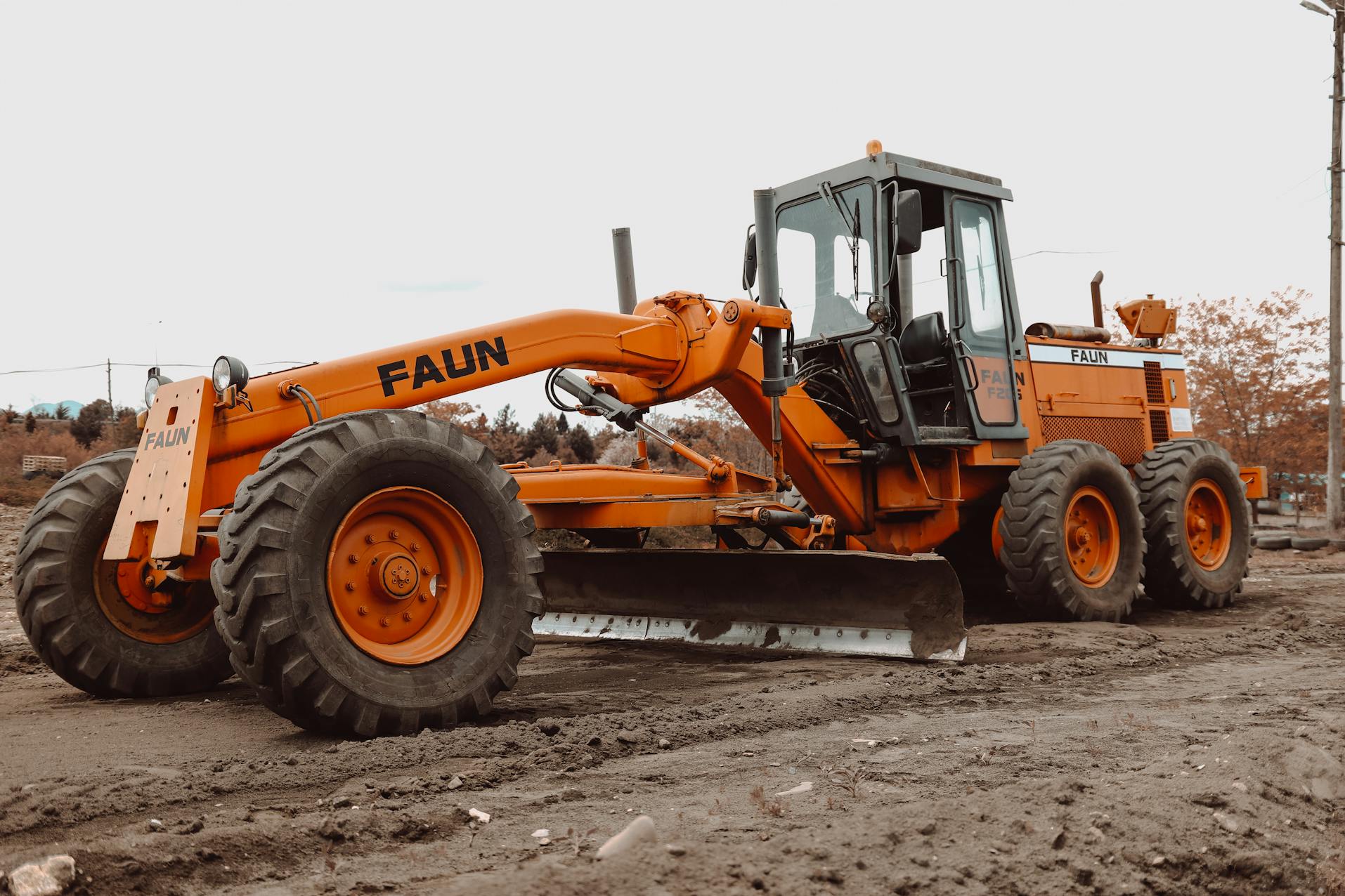 Essential Guide to Road Graders: Machines and Maintenance