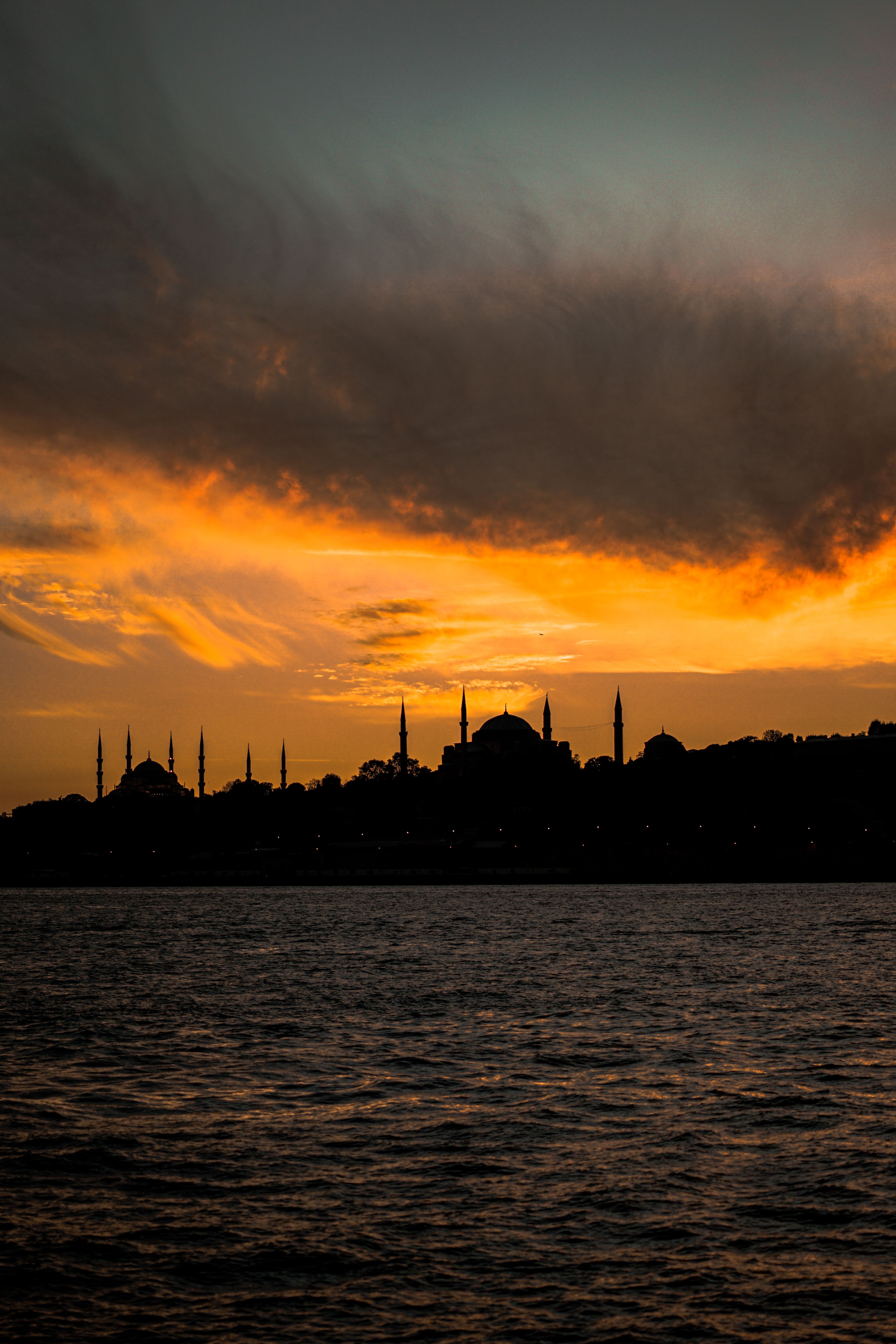 Rain Cloud over Sea Coast in Istanbul at Sunset · Free Stock Photo