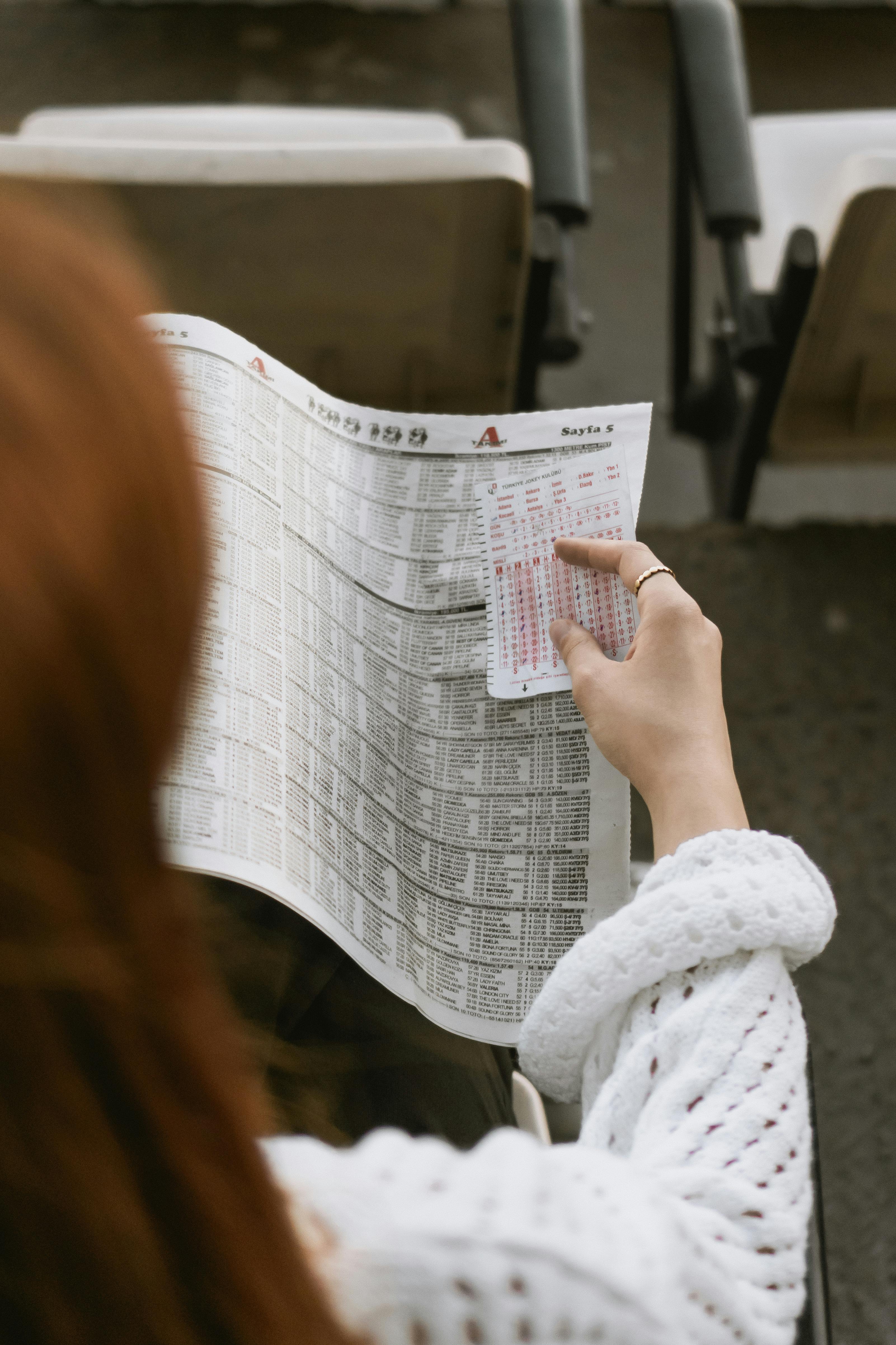 A Close-Up Shot of Newspapers · Free Stock Photo
