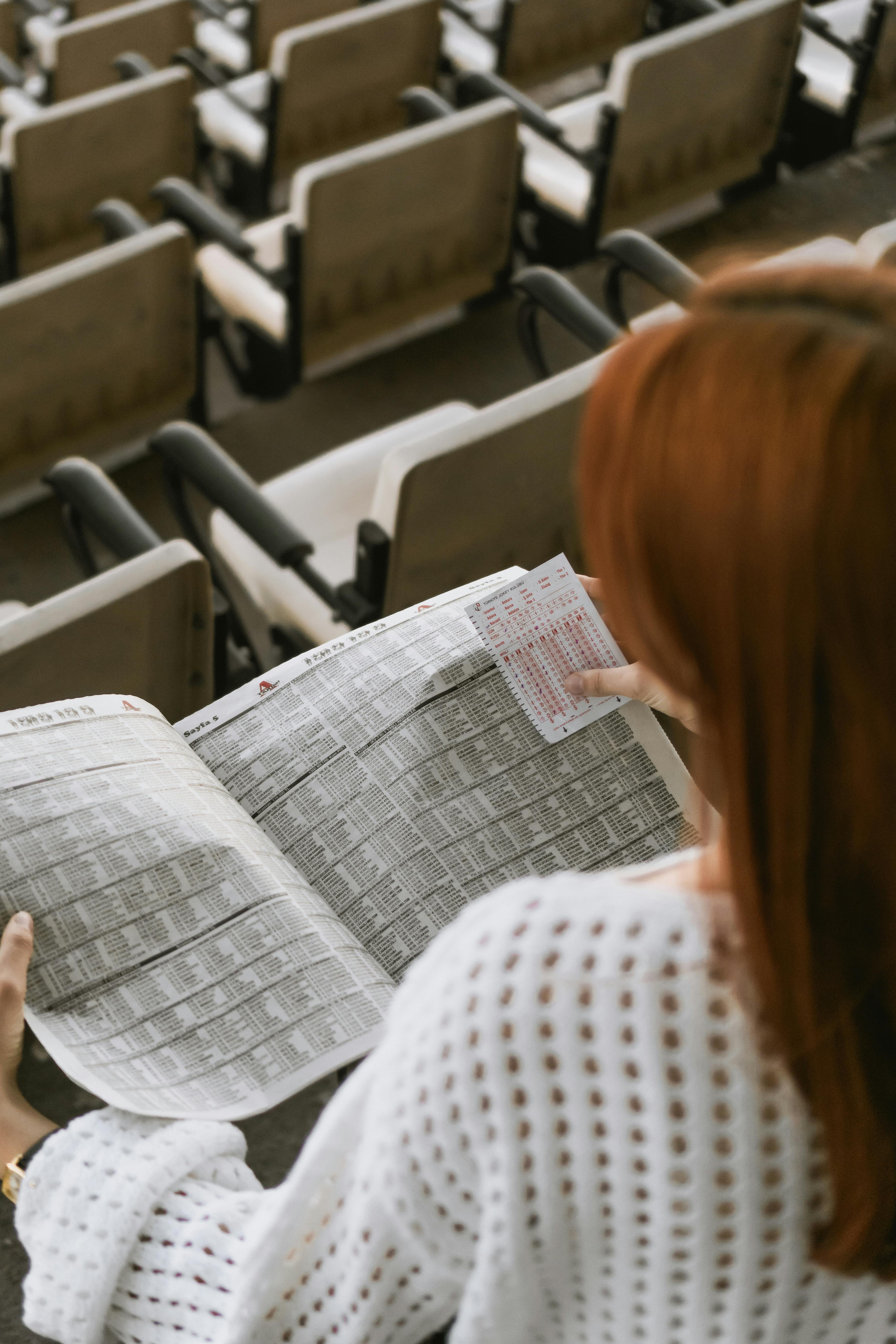 A Close-Up Shot of Newspapers · Free Stock Photo