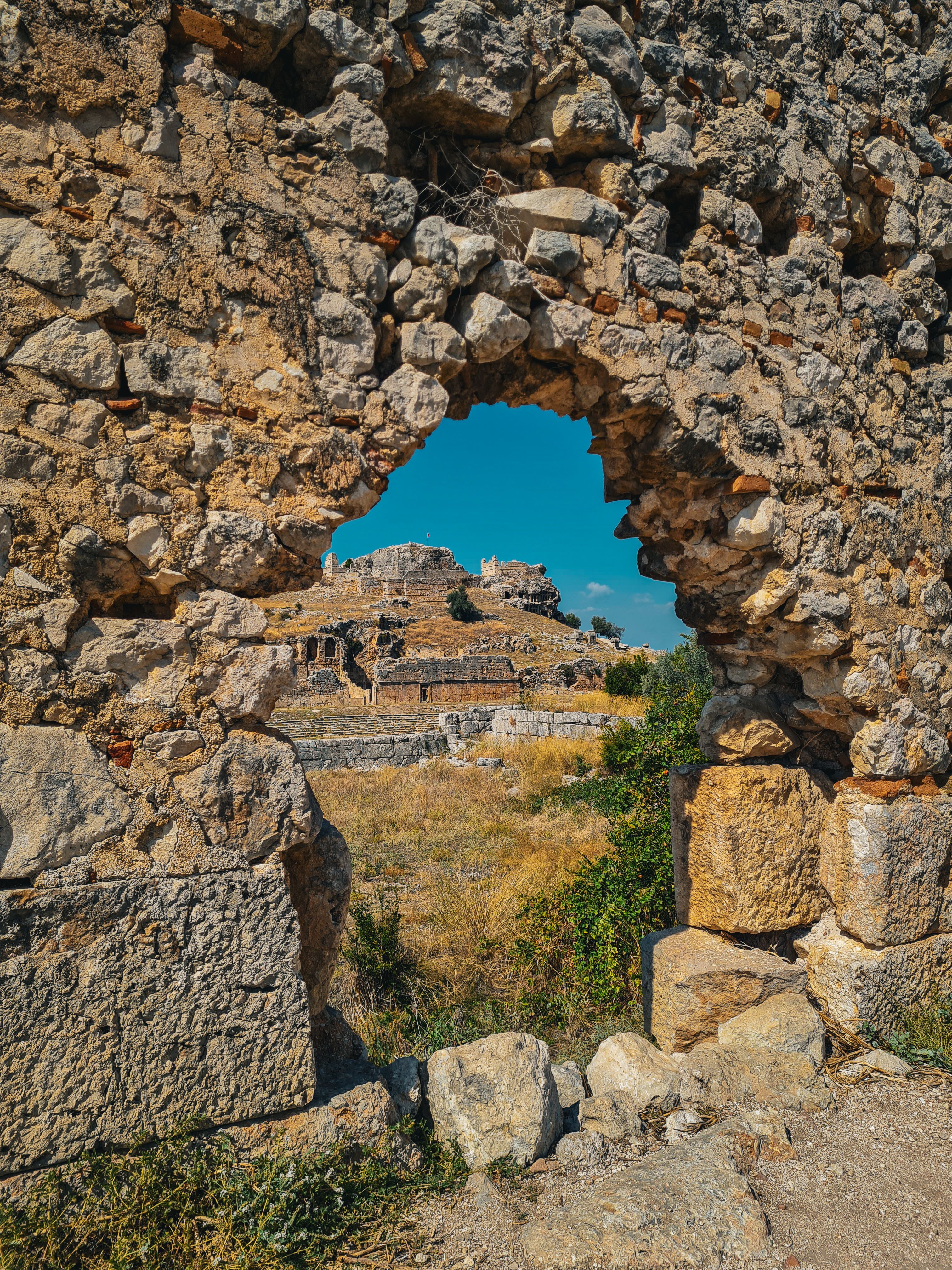 Ruins of the Ancient City of Tlos Through a Hole in the Stone Wall ...