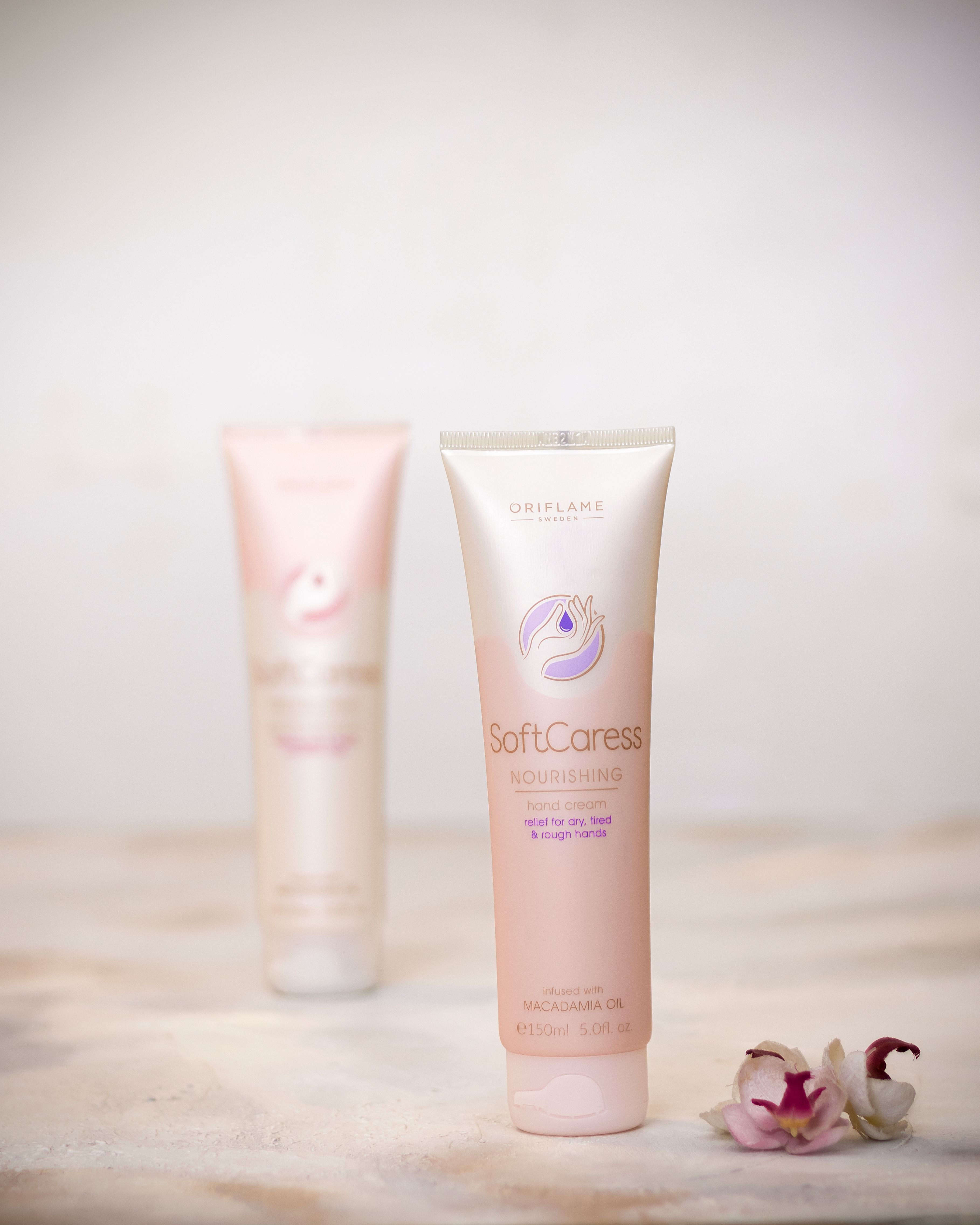 Tubes of Oriflame SoftCaress Nourishing Hand Cream · Free Stock Photo