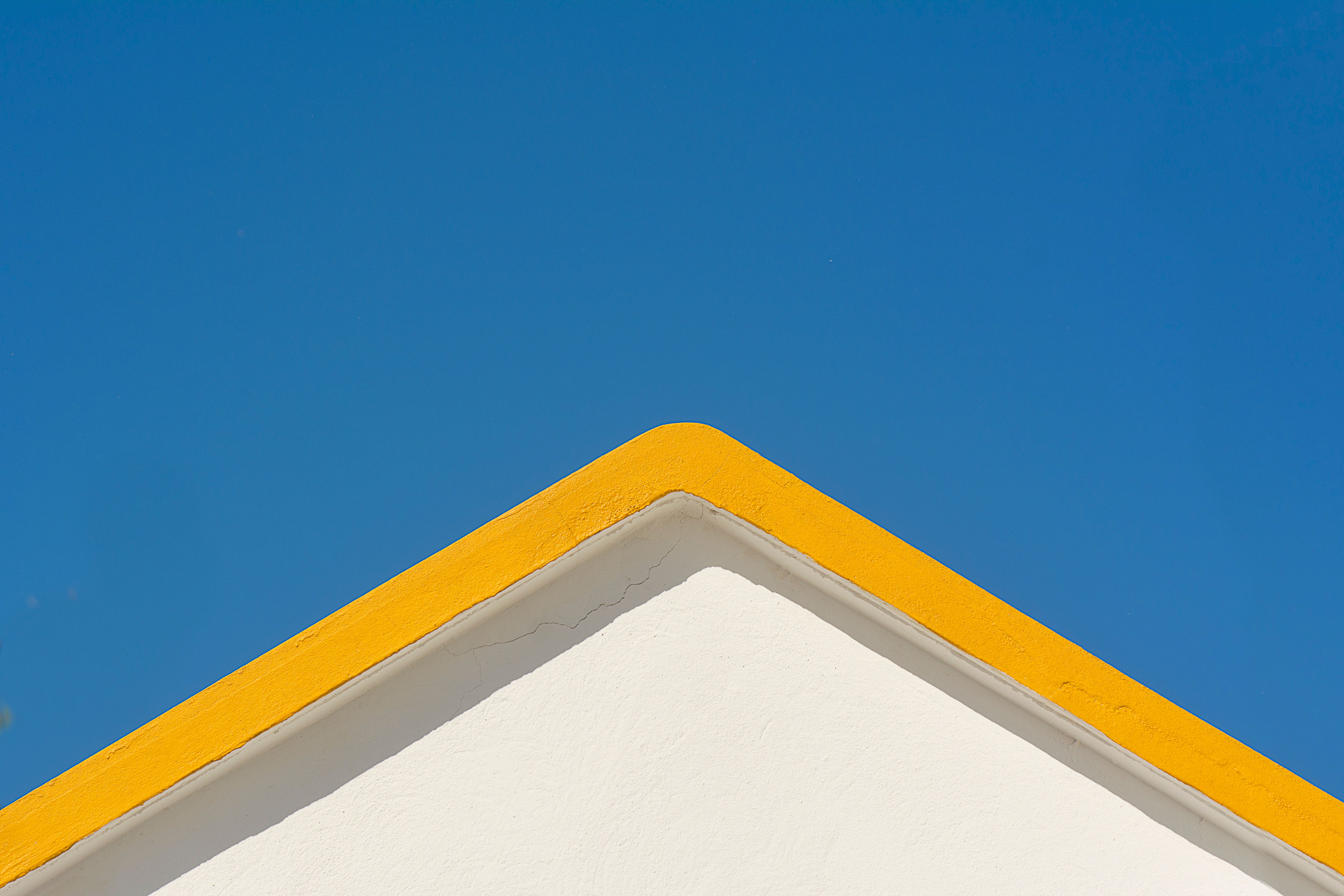 Yellow Roof Line of White House Wall against Clear Blue Sky · Free ...