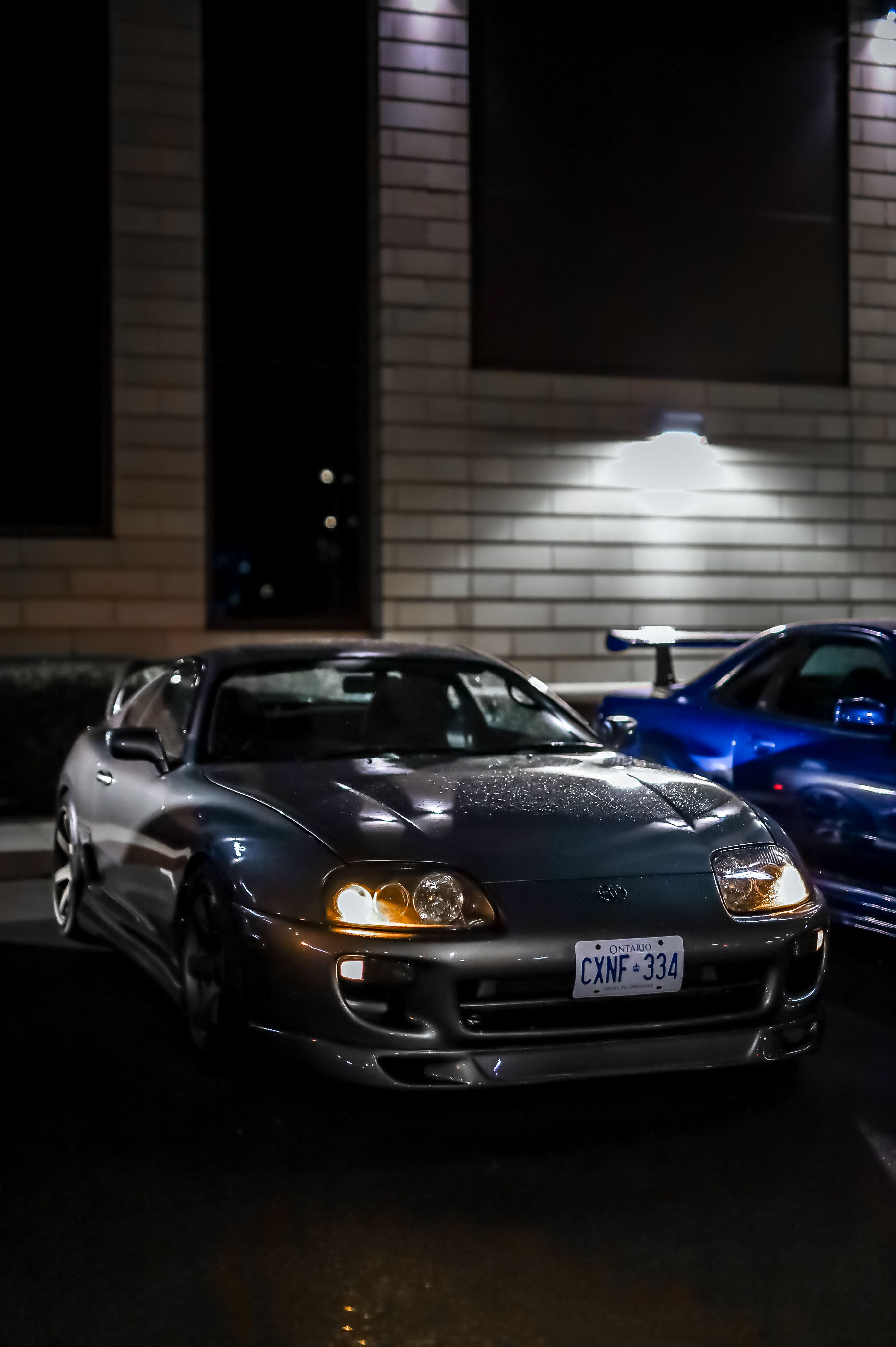 Nissan Skyline GT-R on a Parking Lot at Night · Free Stock Photo