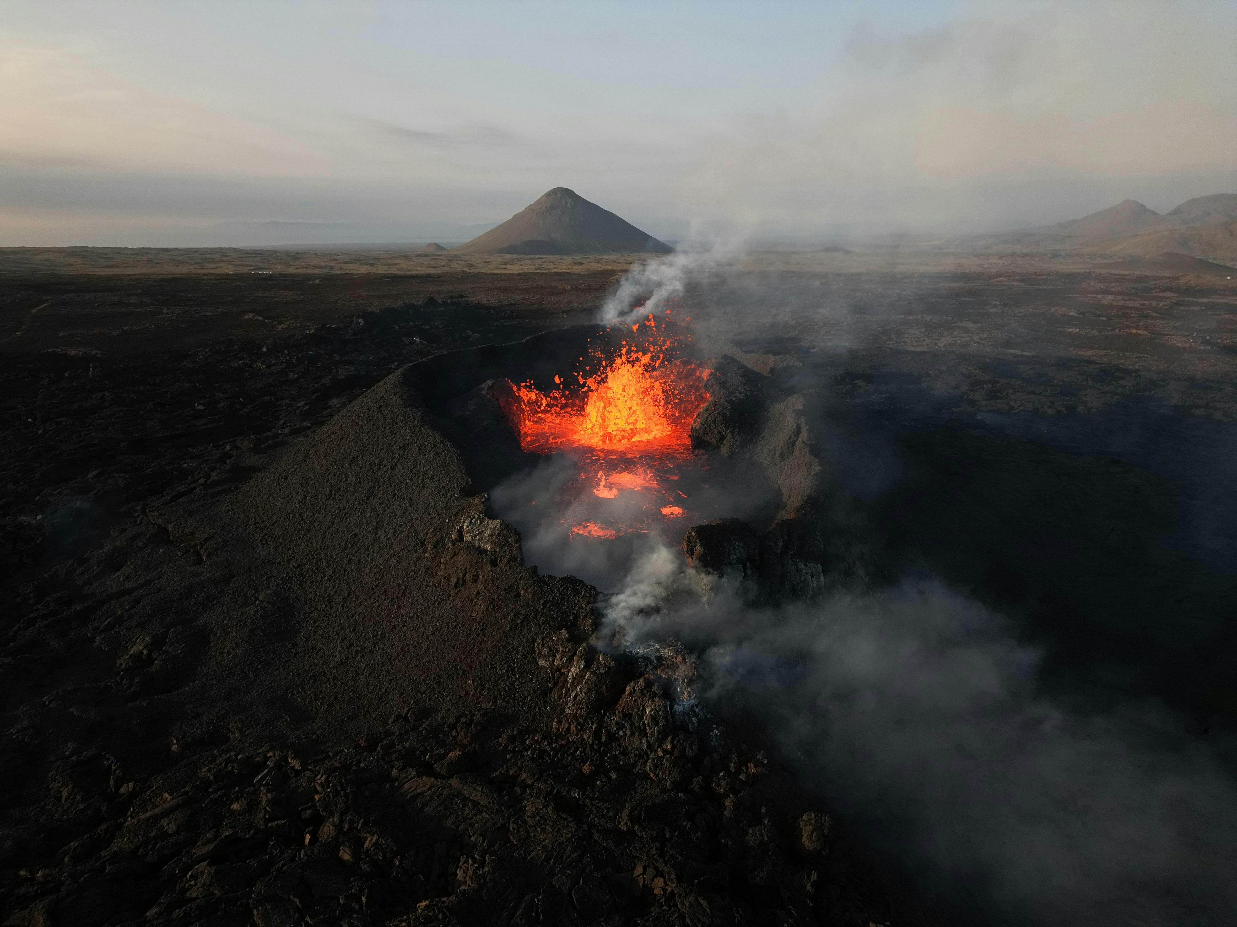 Aerial View of an Erupting Volcano · Free Stock Photo