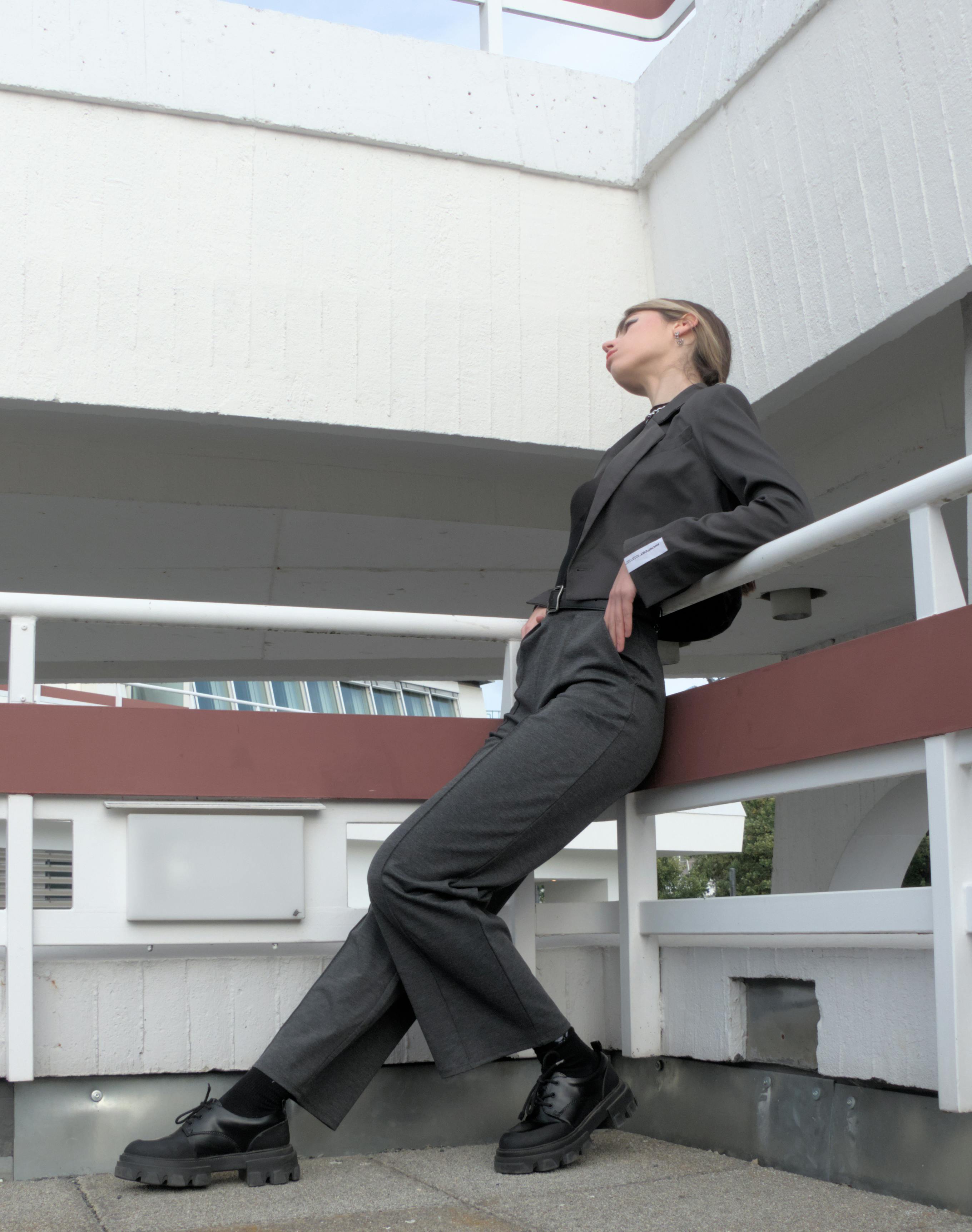 Woman Leaning on the Railing · Free Stock Photo