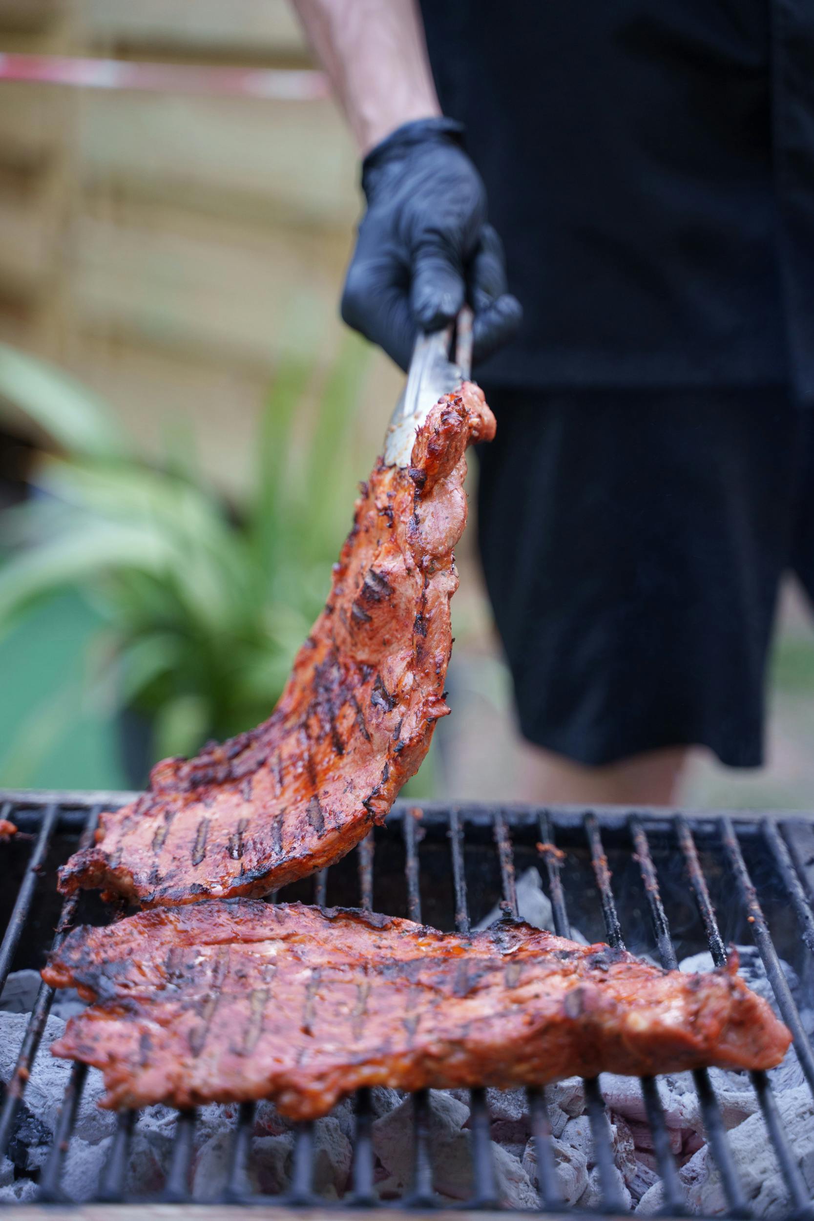 Person Preparing Food on Barbecue · Free Stock Photo