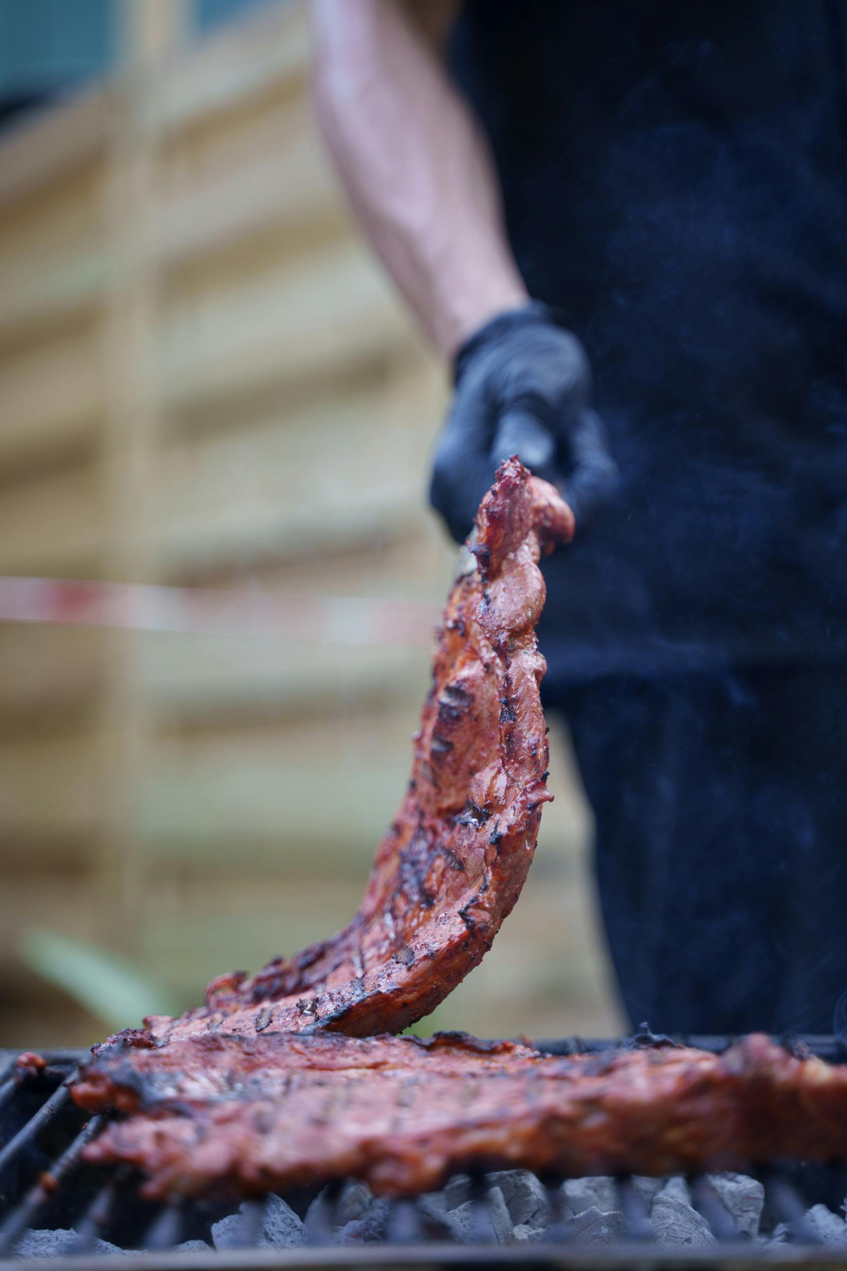 Person Preparing Food on Barbecue · Free Stock Photo