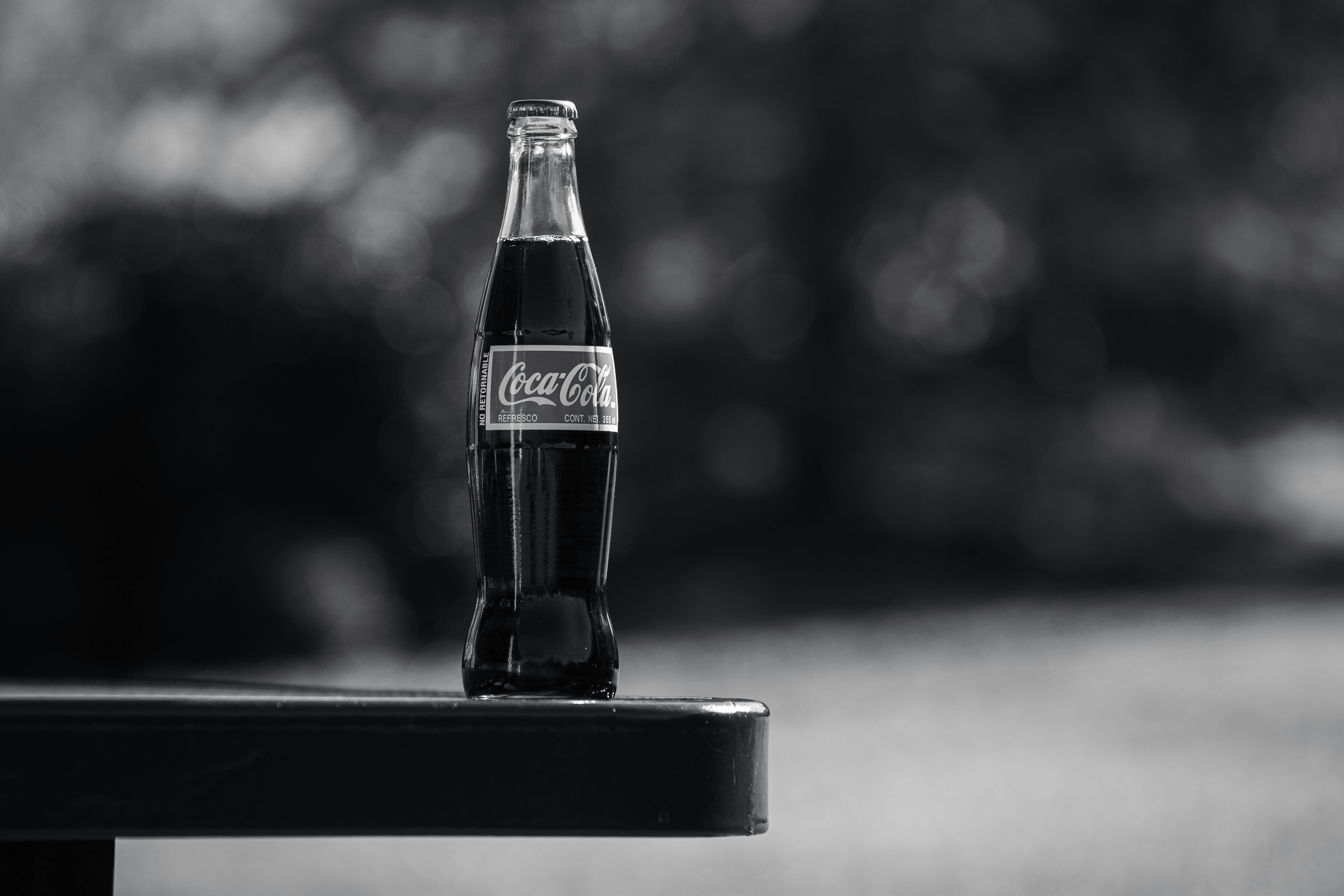 Three White and Brass Coca-cola Bottles · Free Stock Photo