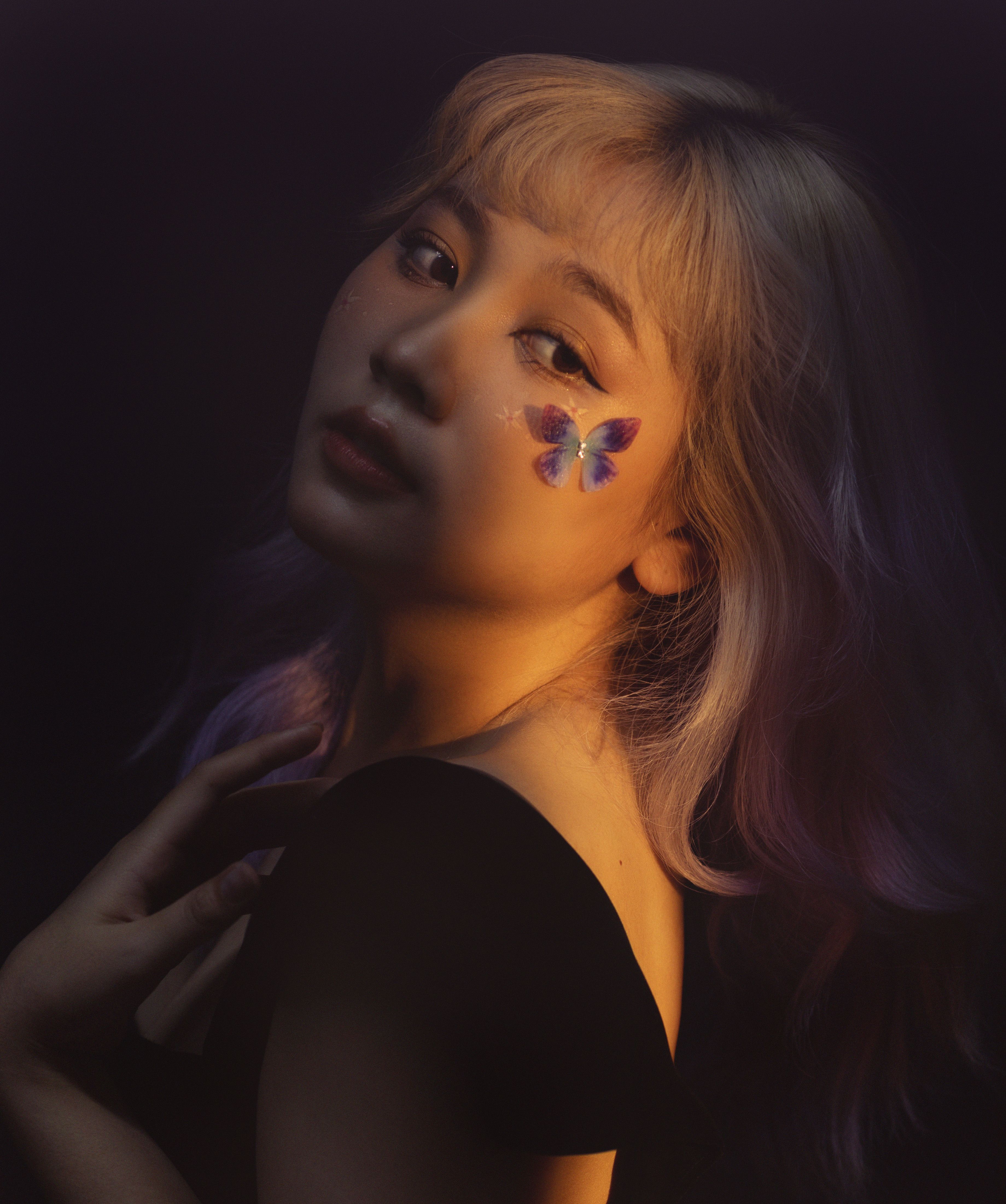 Young Woman with a Butterfly on Her Cheek · Free Stock Photo