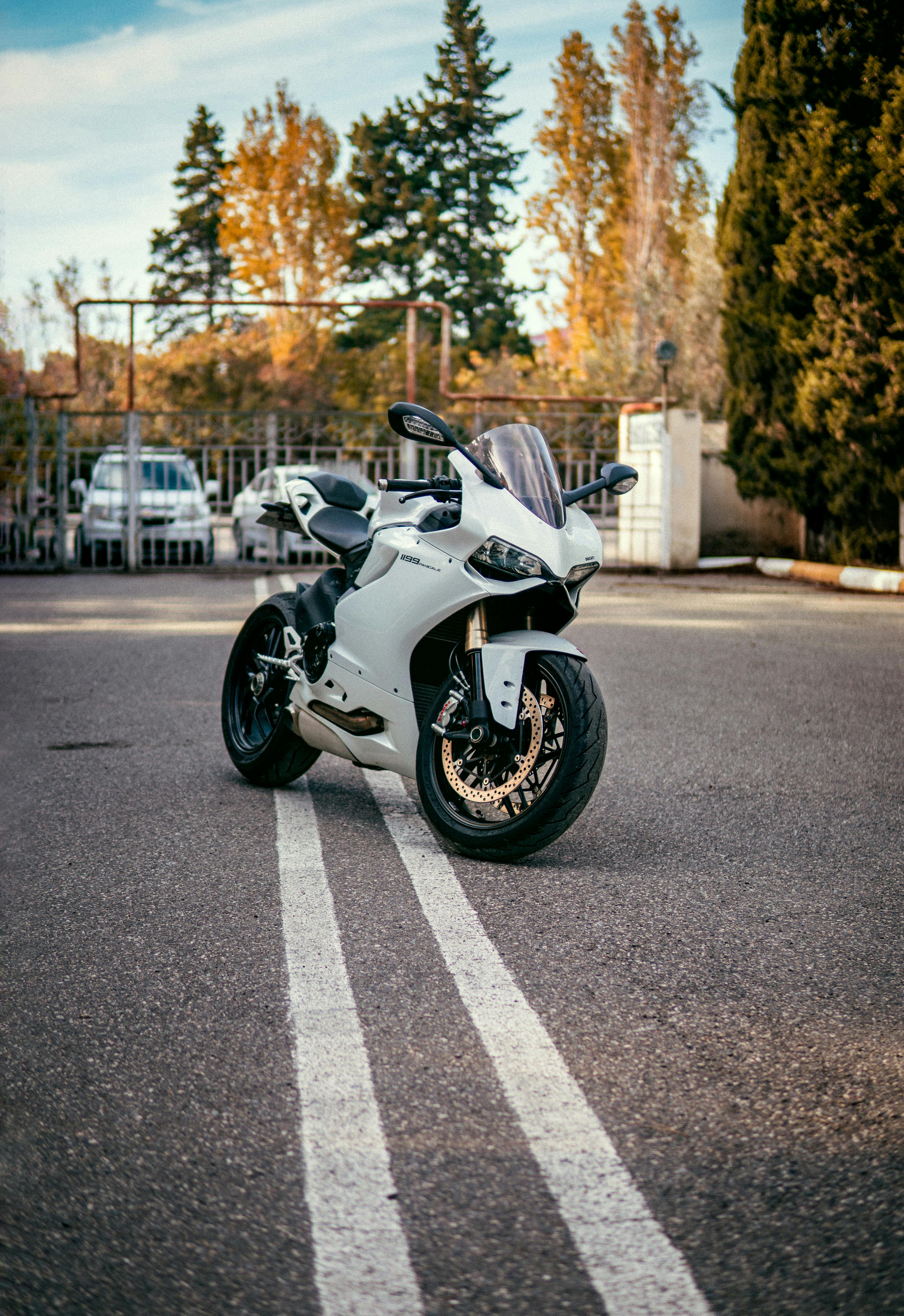 White Motorcycle on Road · Free Stock Photo