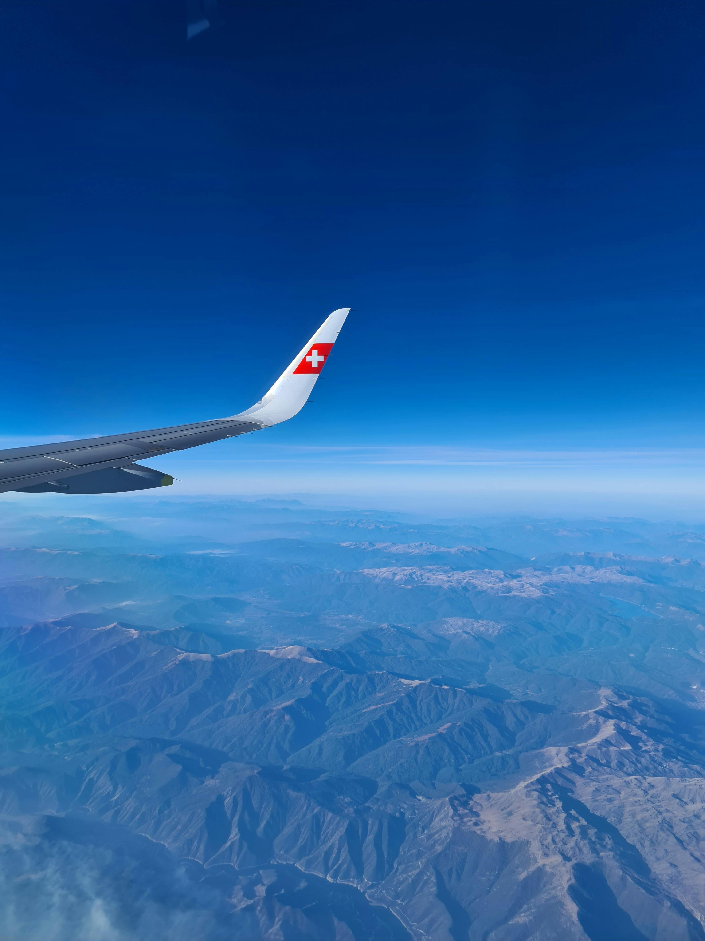 Wing of Flying Airplane · Free Stock Photo