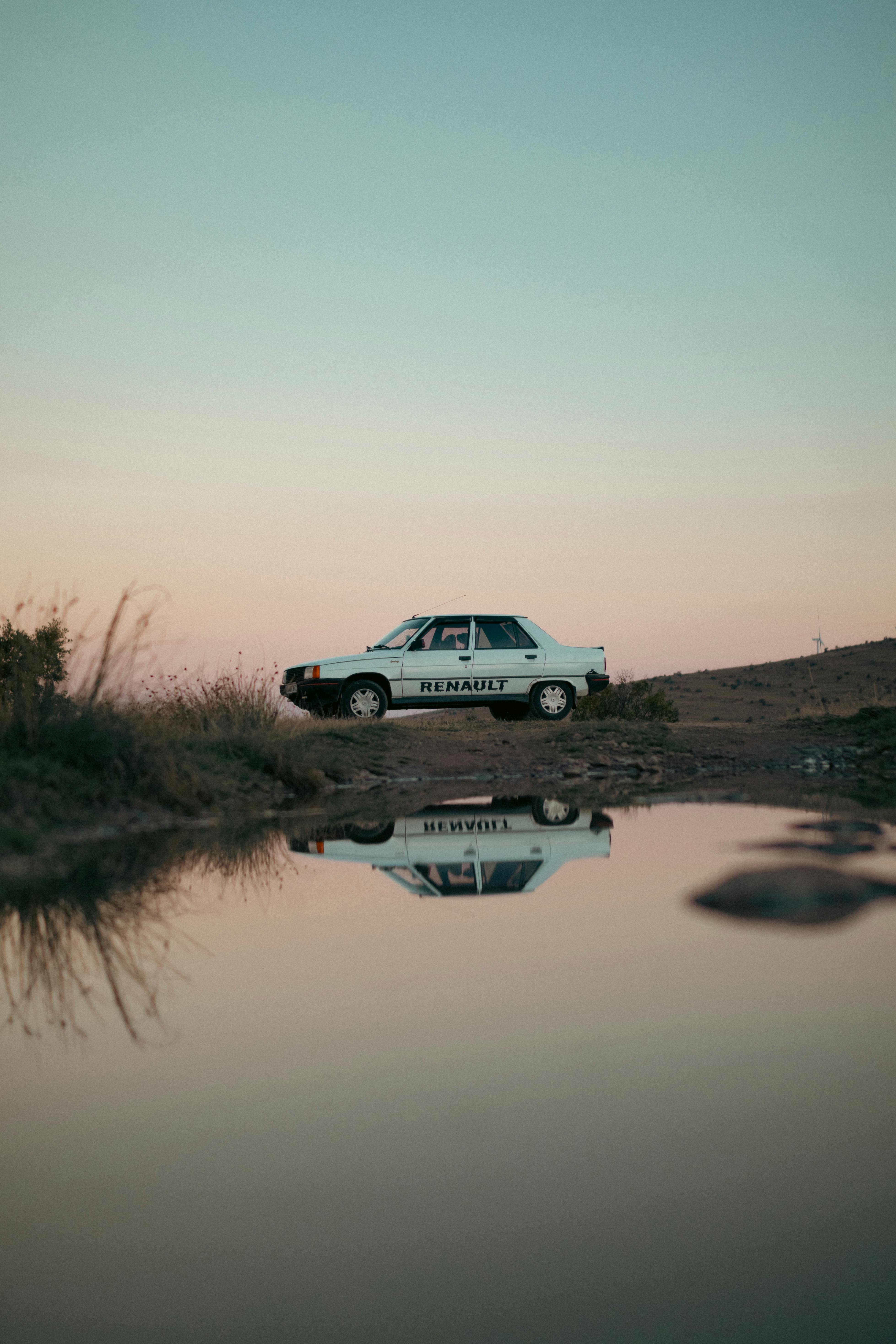 Car Reflecting in a Lake · Free Stock Photo