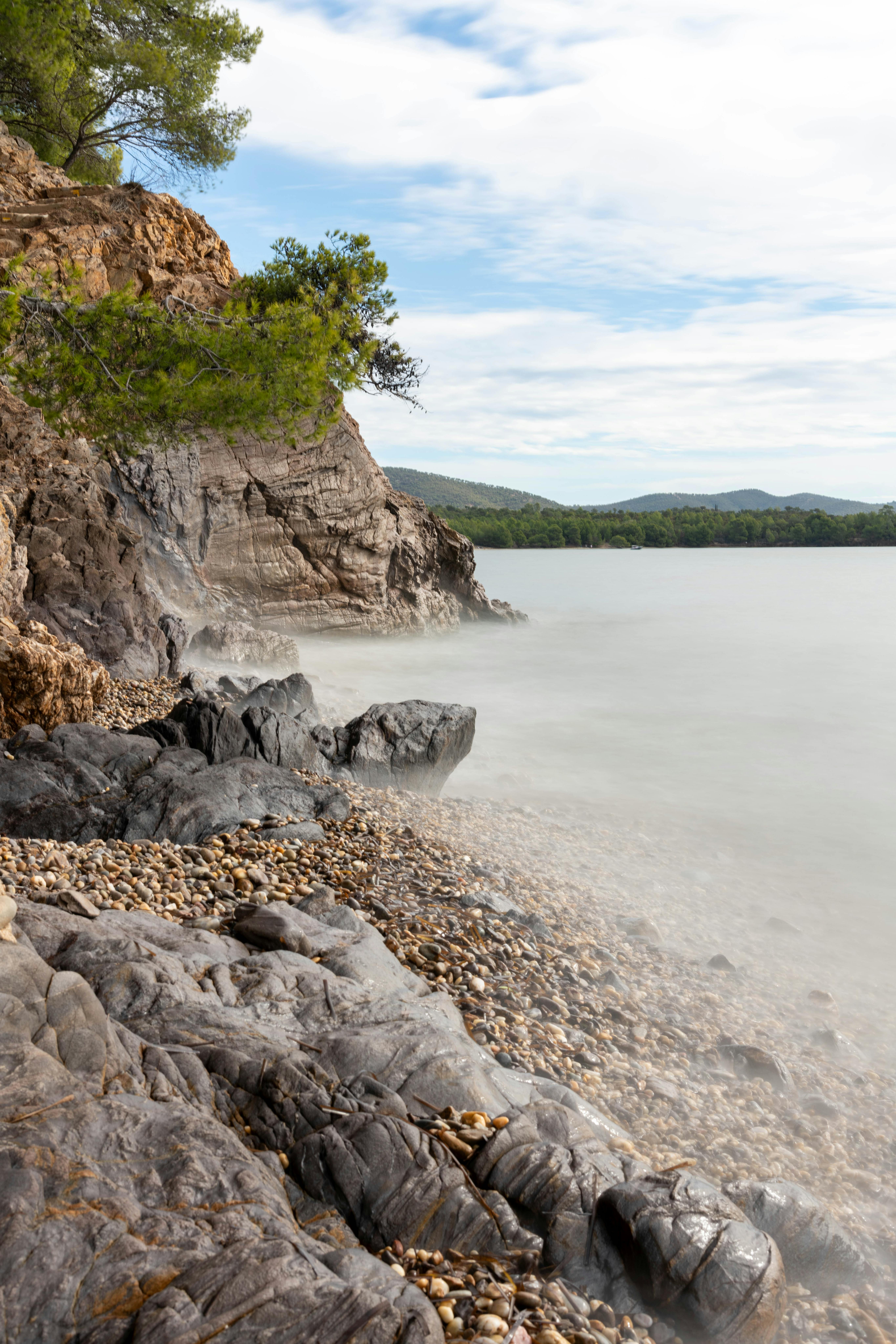 Rock Formations on Lakeshore · Free Stock Photo