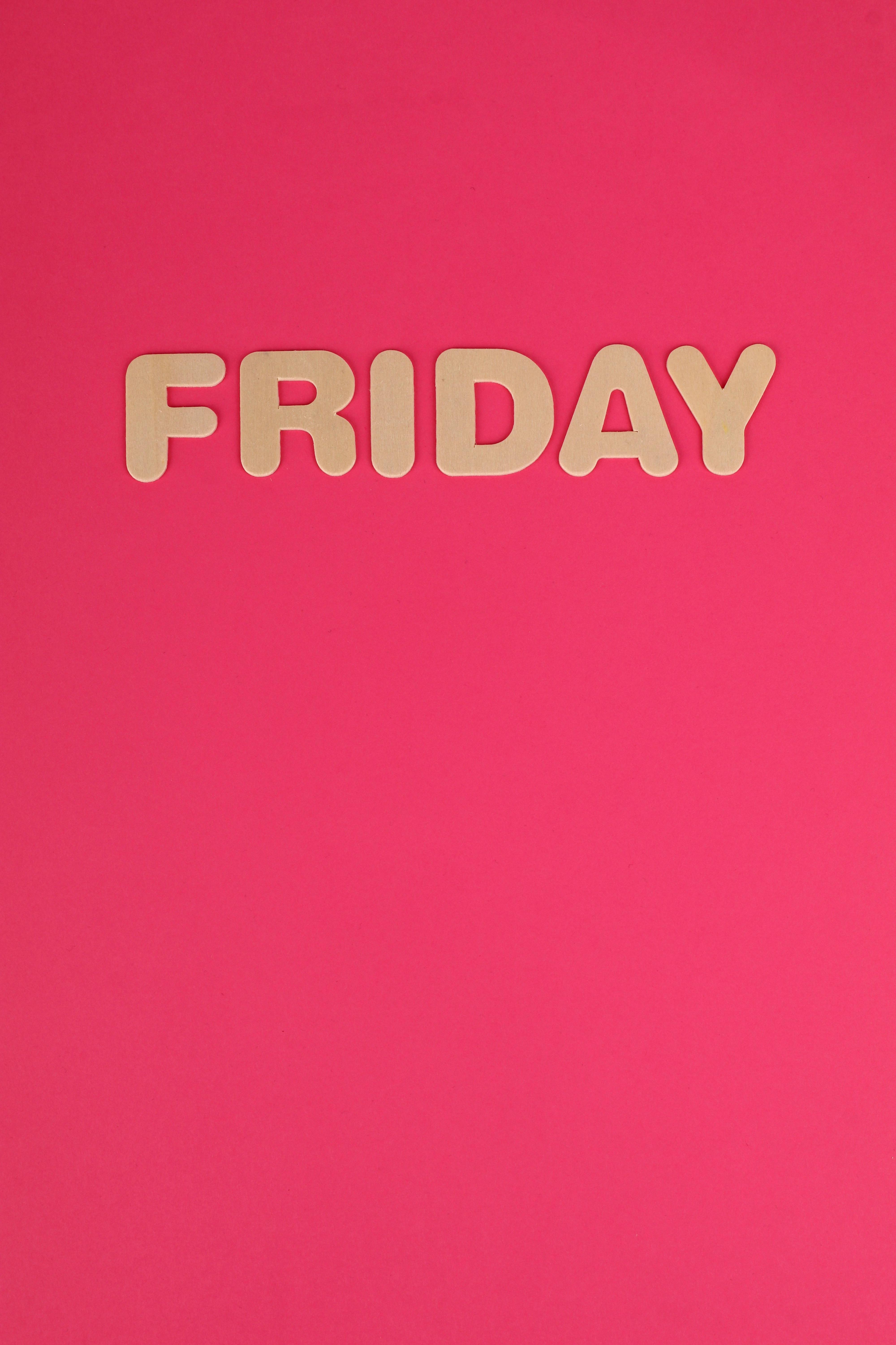 Pink Wallpaper with Friday Sign · Free Stock Photo