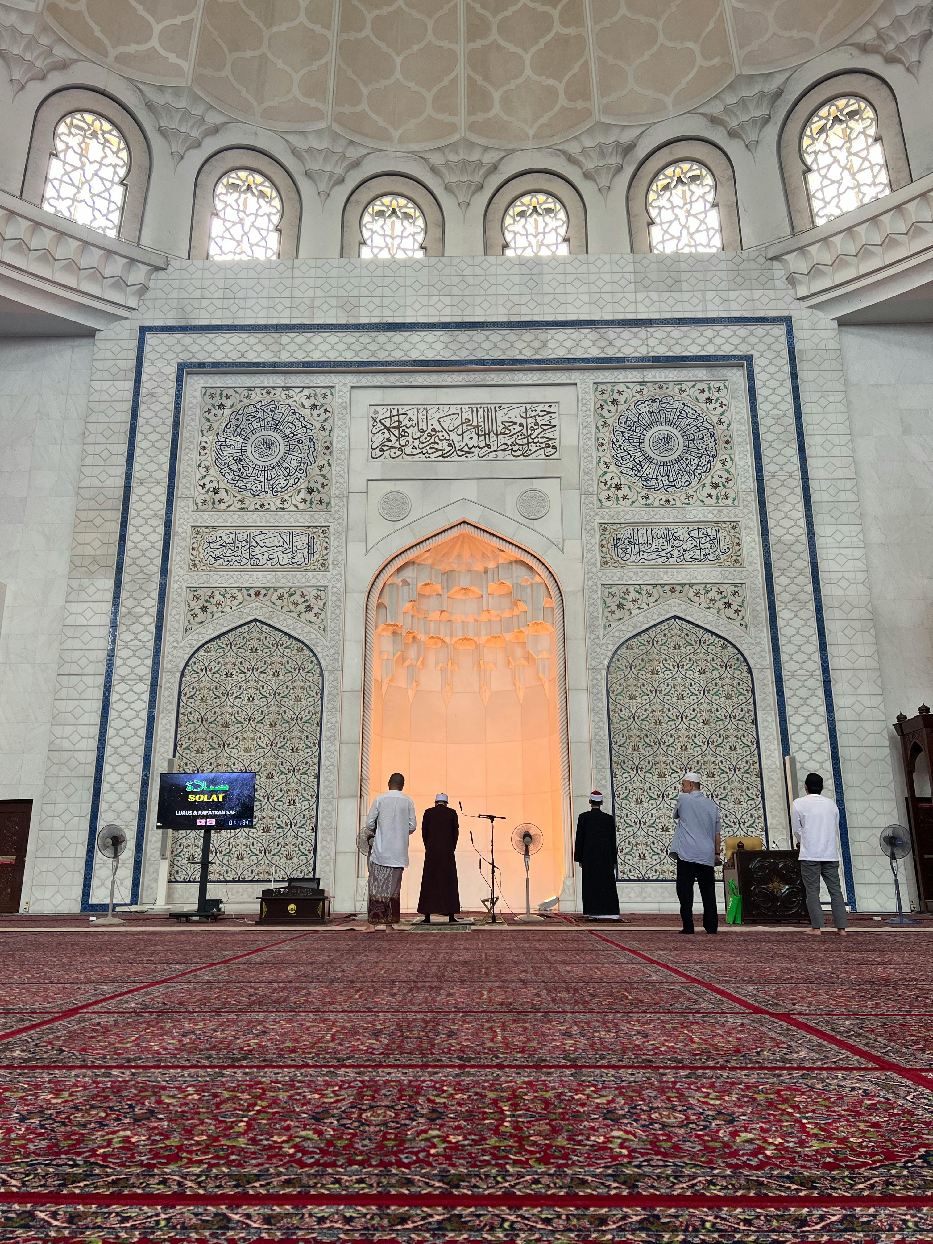 People Standing Inside a Mosque · Free Stock Photo
