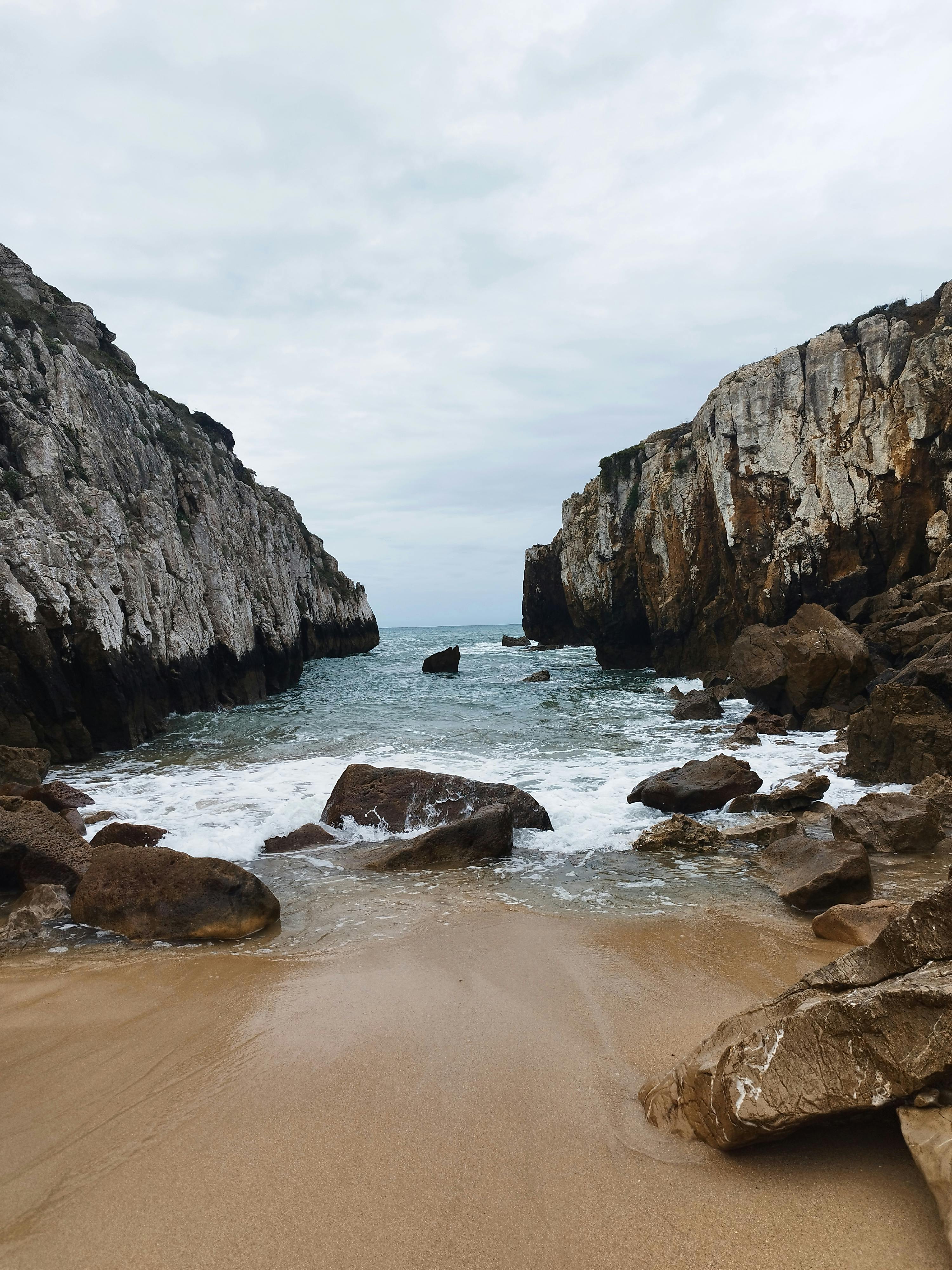 Sea Waves Splashing Through Rocks · Free Stock Photo