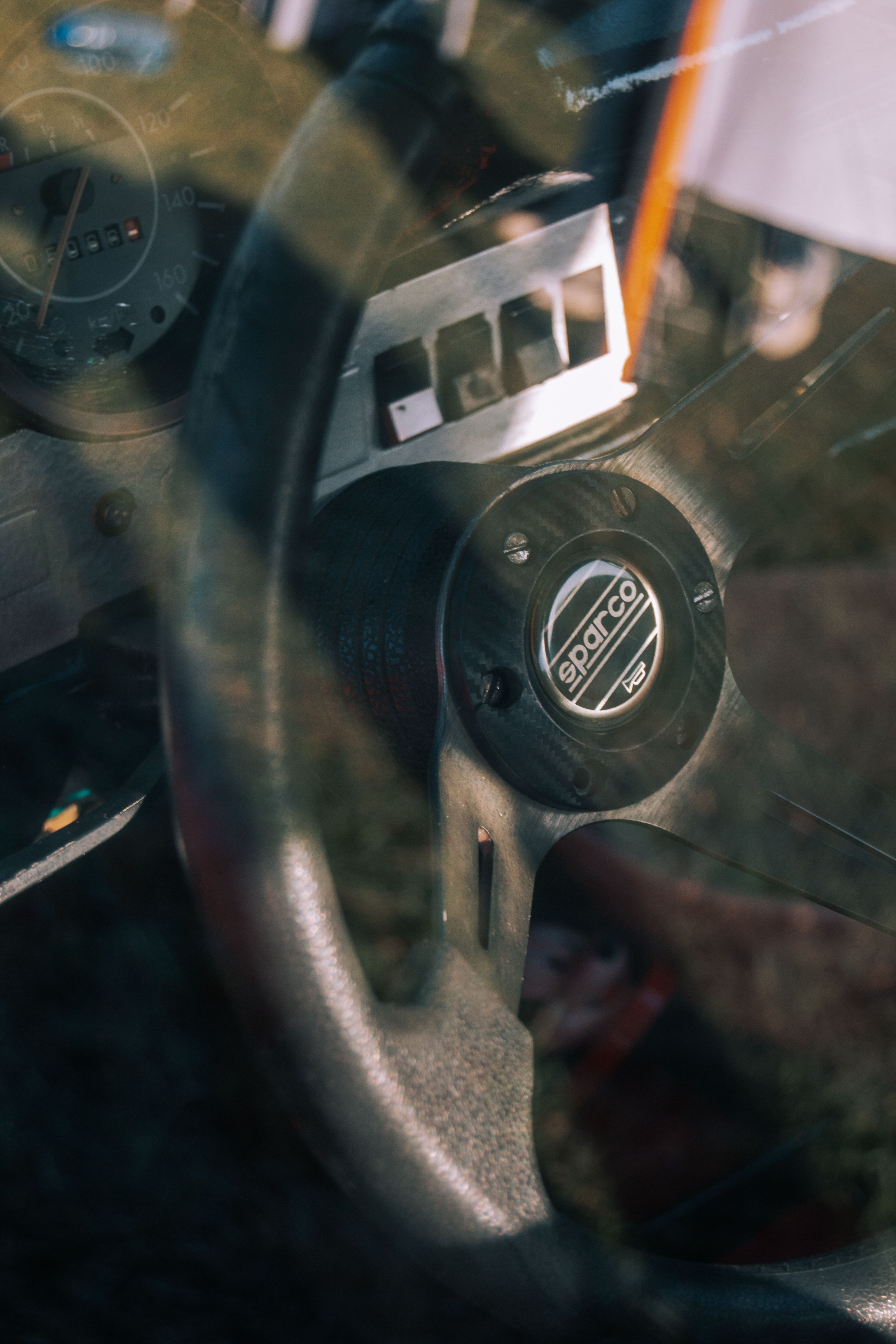 Steering Wheel behind Car Window · Free Stock Photo