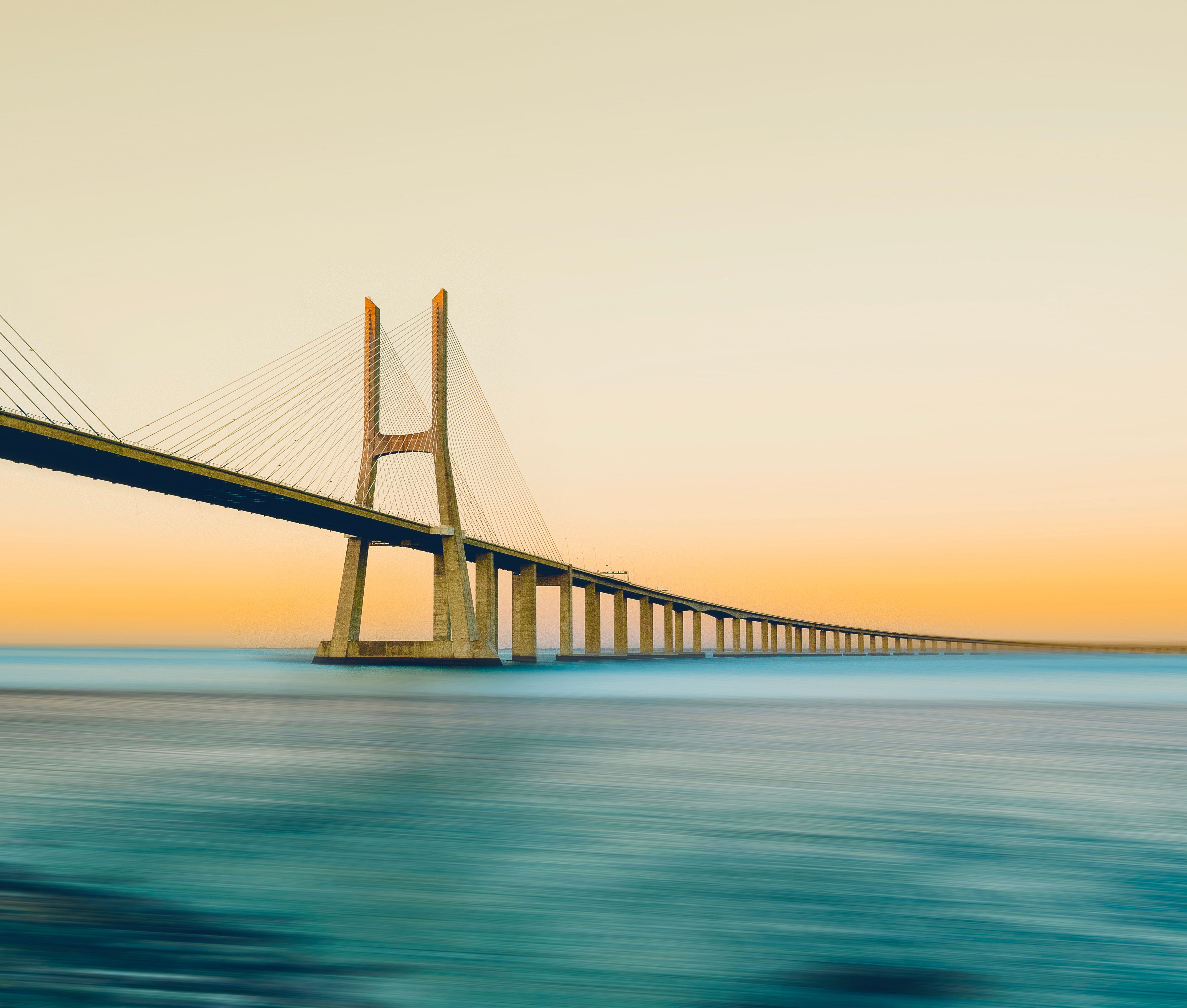 Vasco da Gama Bridge at Sunset · Free Stock Photo