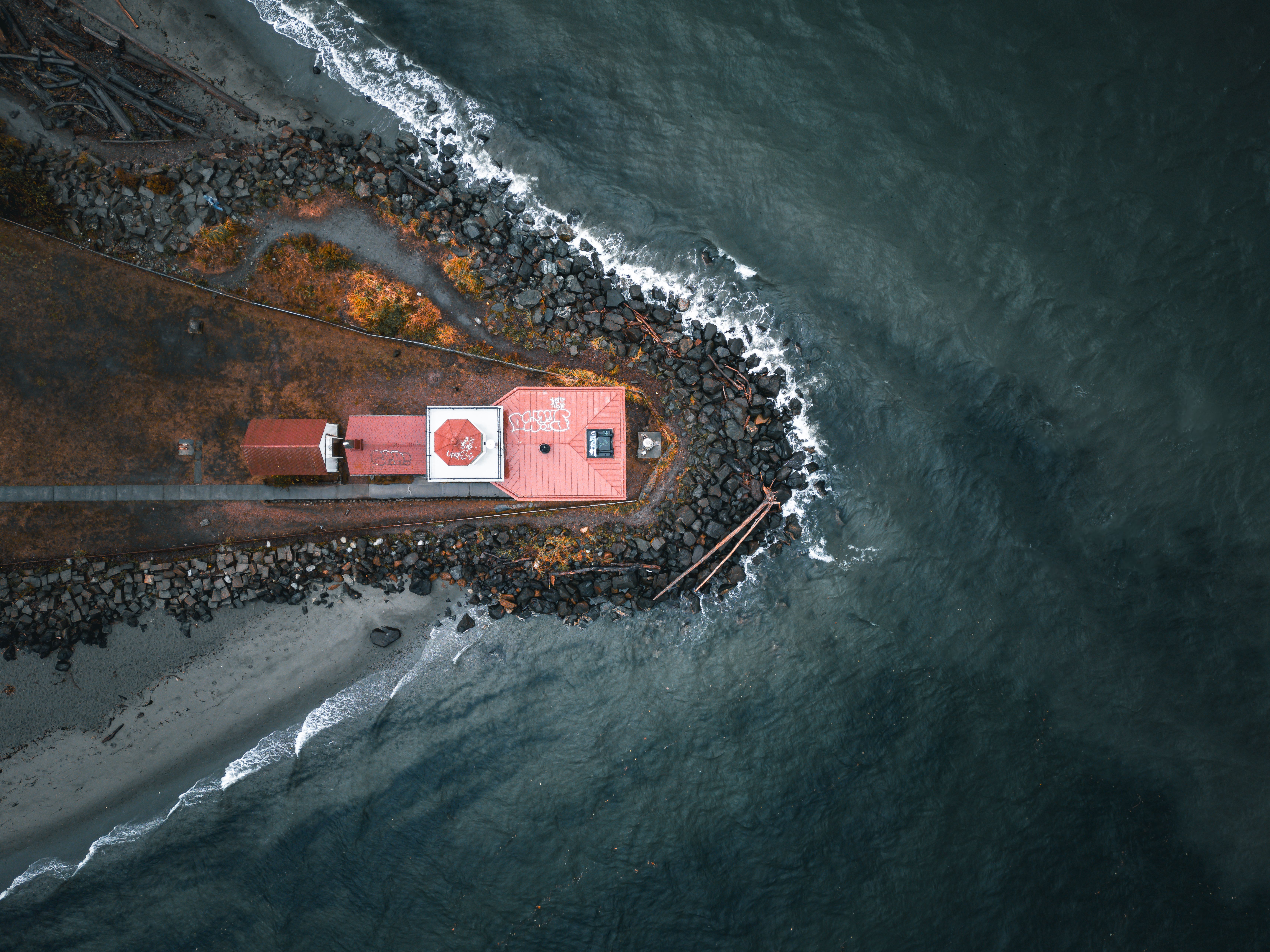 Birds Eye View of Sea Shore and Lighthouse · Free Stock Photo