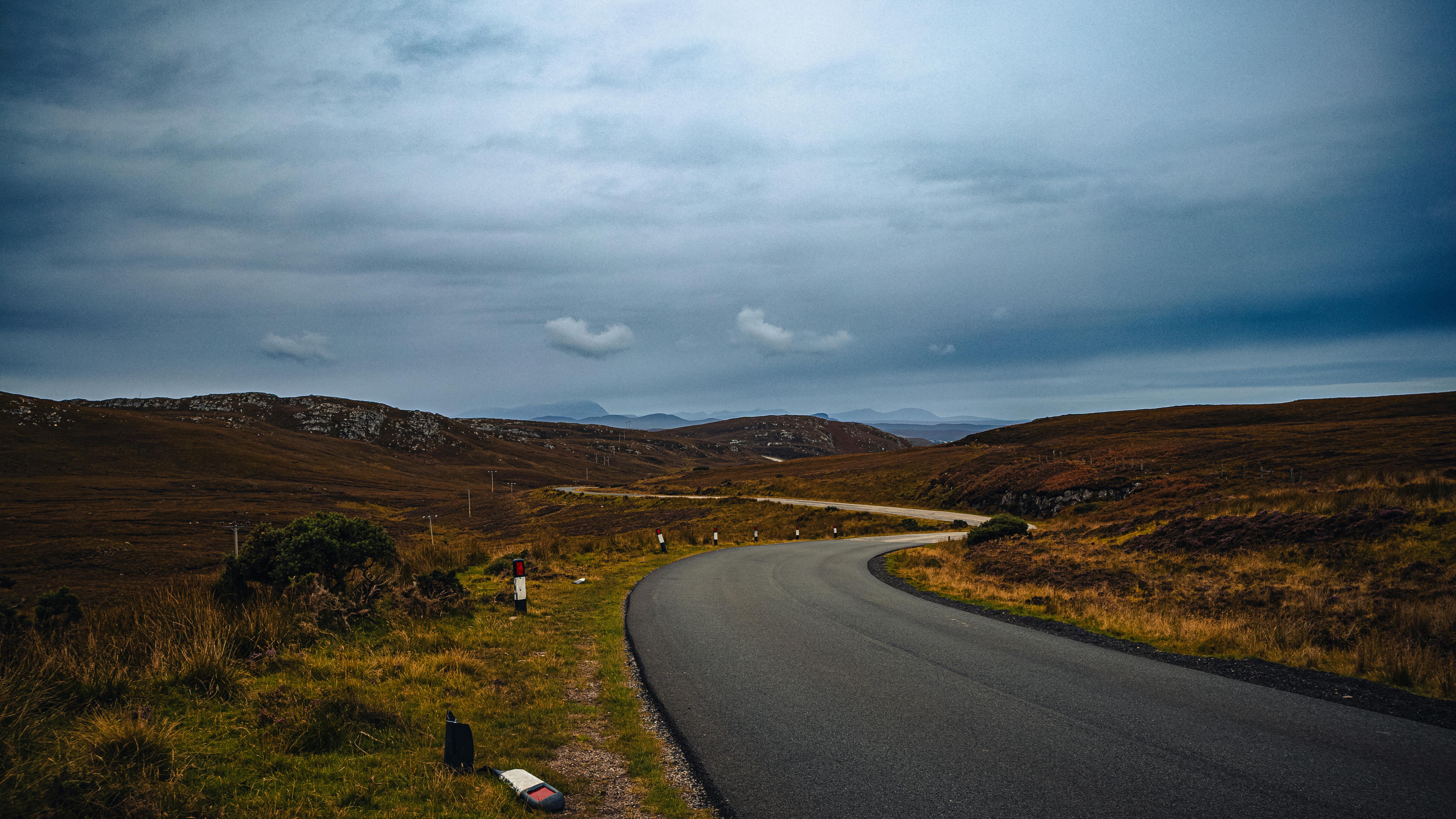 Curved Rural Road without Lines · Free Stock Photo