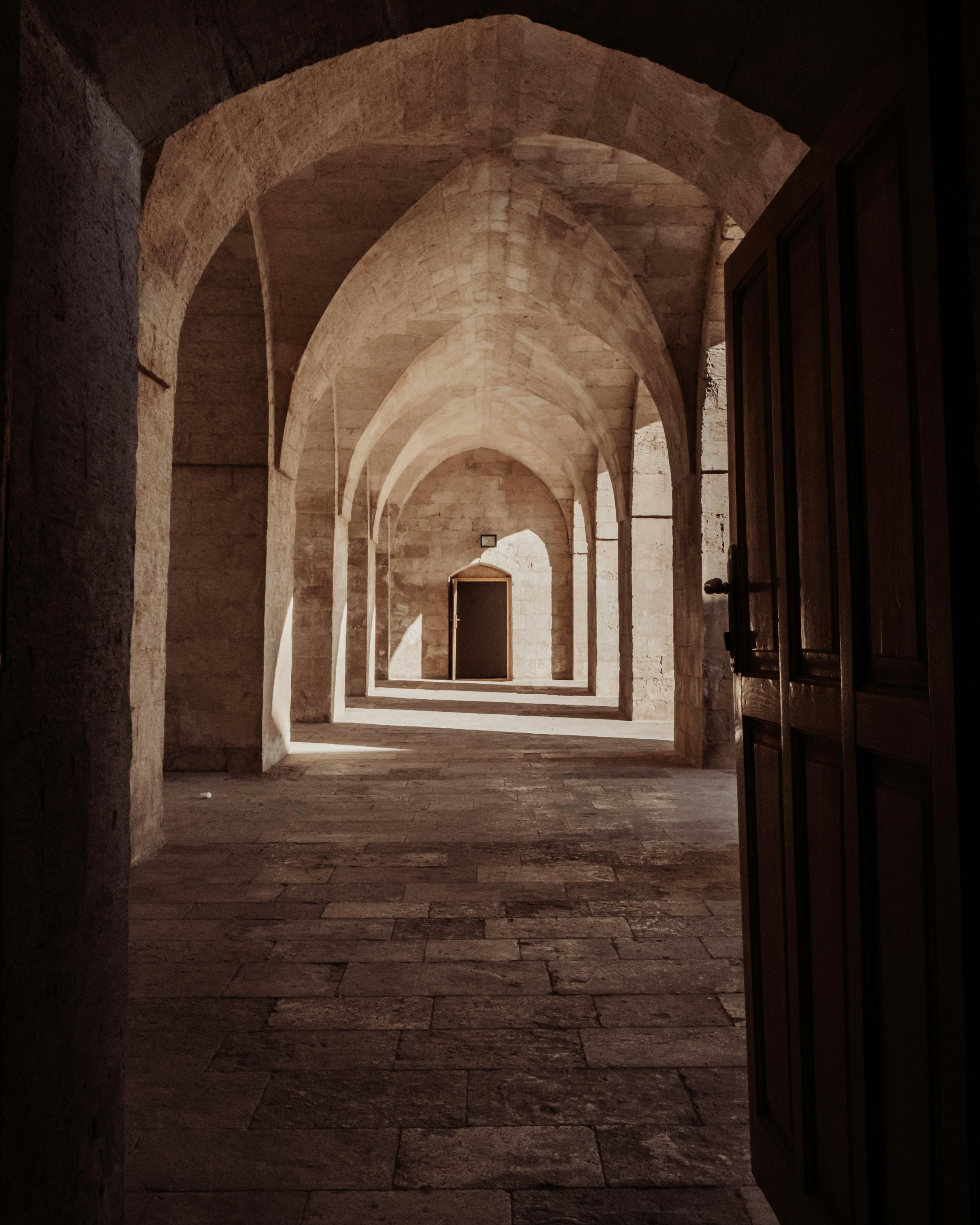 An Arcade and Corridor of a Monumental Building · Free Stock Photo