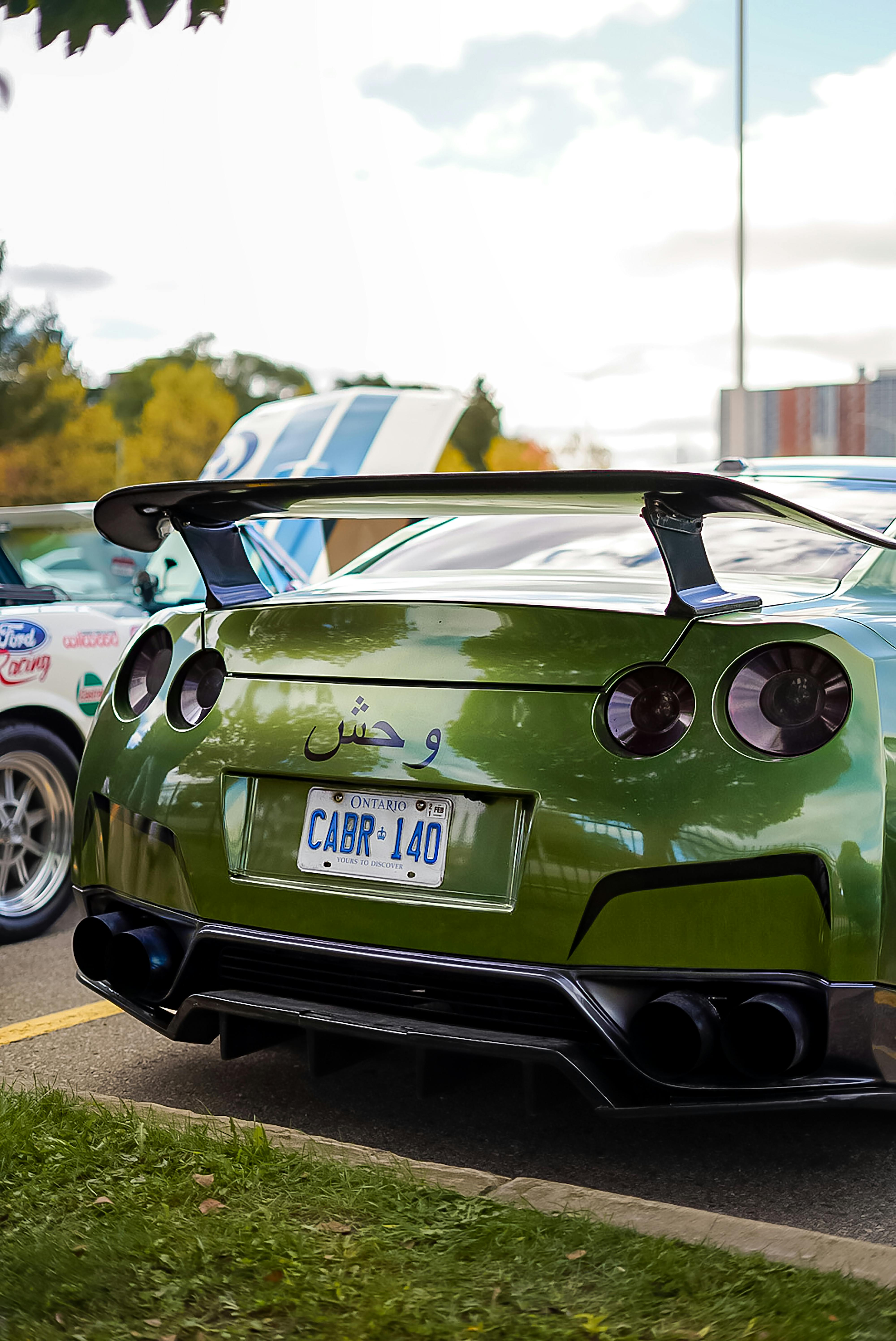 Back View of a Green Sports Car · Free Stock Photo