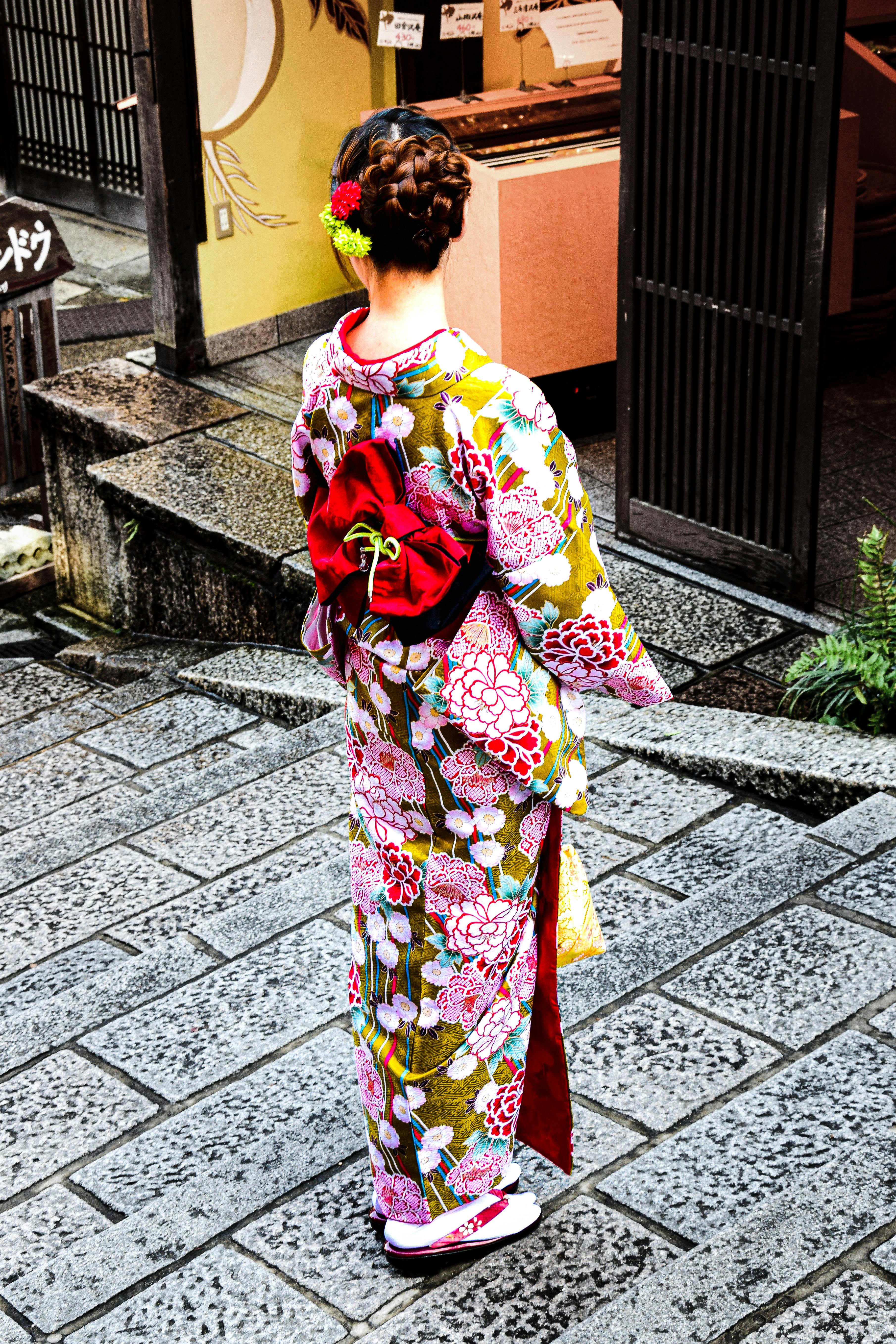 Back View of Japanese Women Wearing Patterned Kimonos · Free Stock Photo