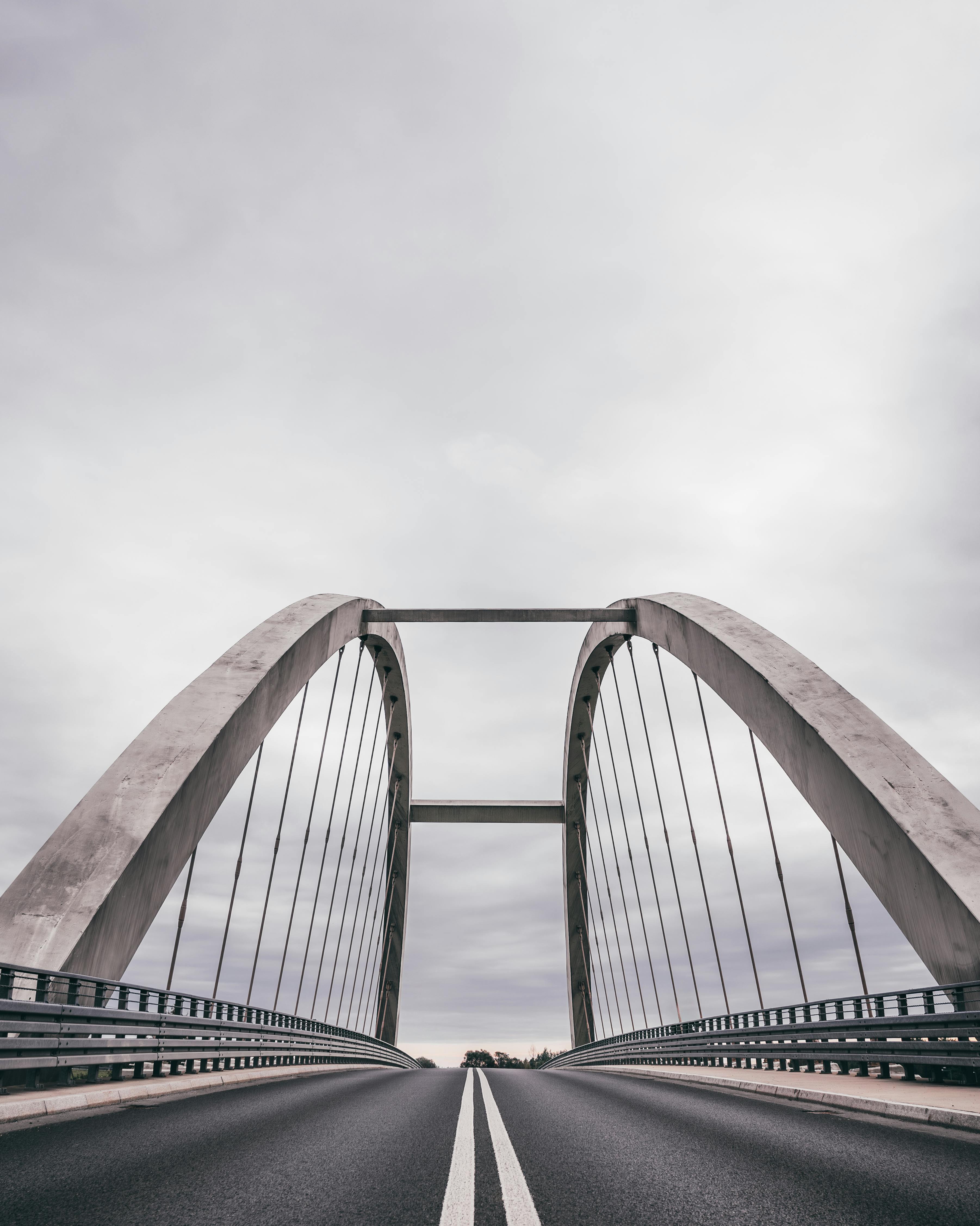 Road with Double Dividing Line and a Bridge · Free Stock Photo