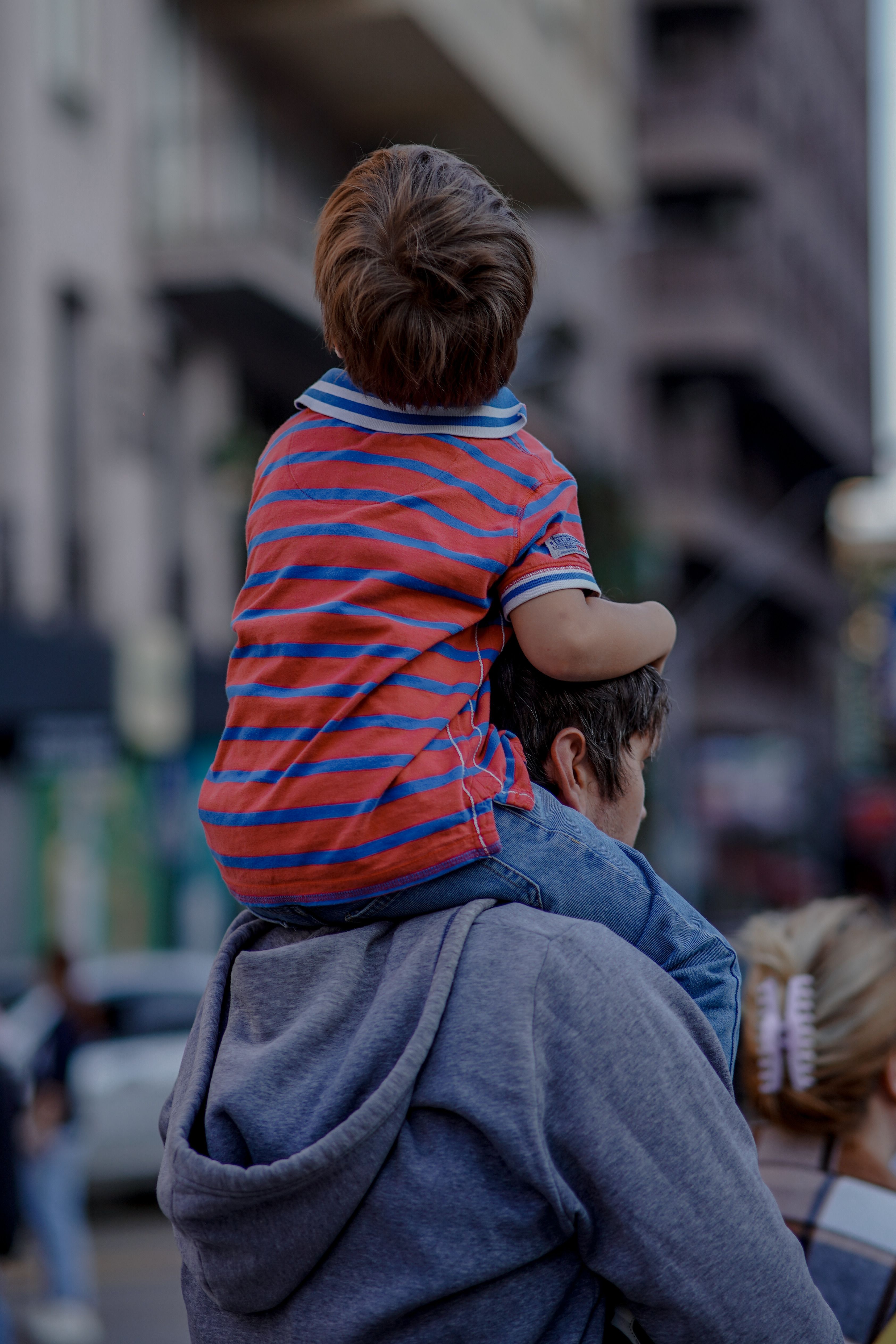 Man Carrying Boy on His Shoulder · Free Stock Photo