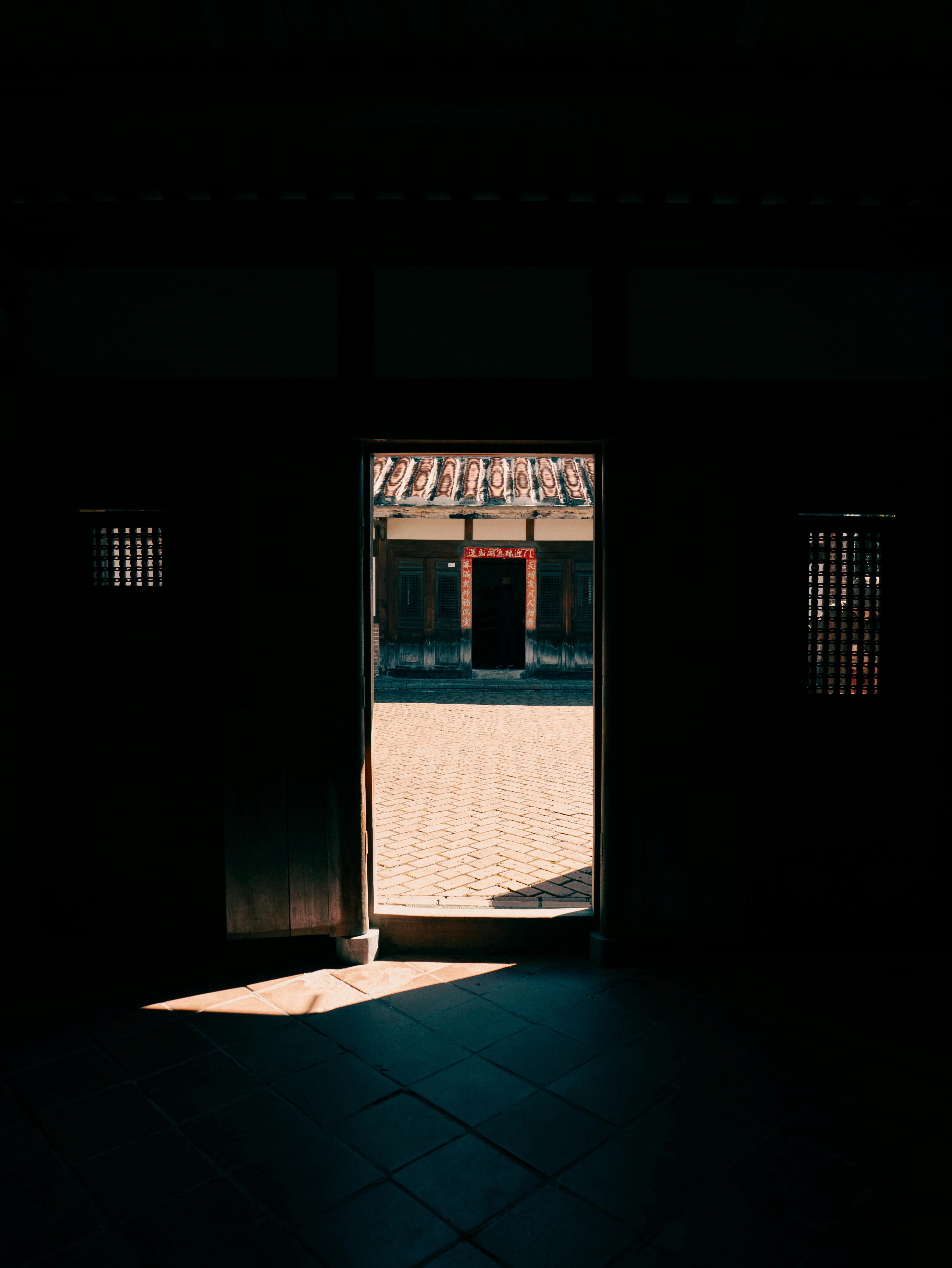 Square behind Building Doorway · Free Stock Photo