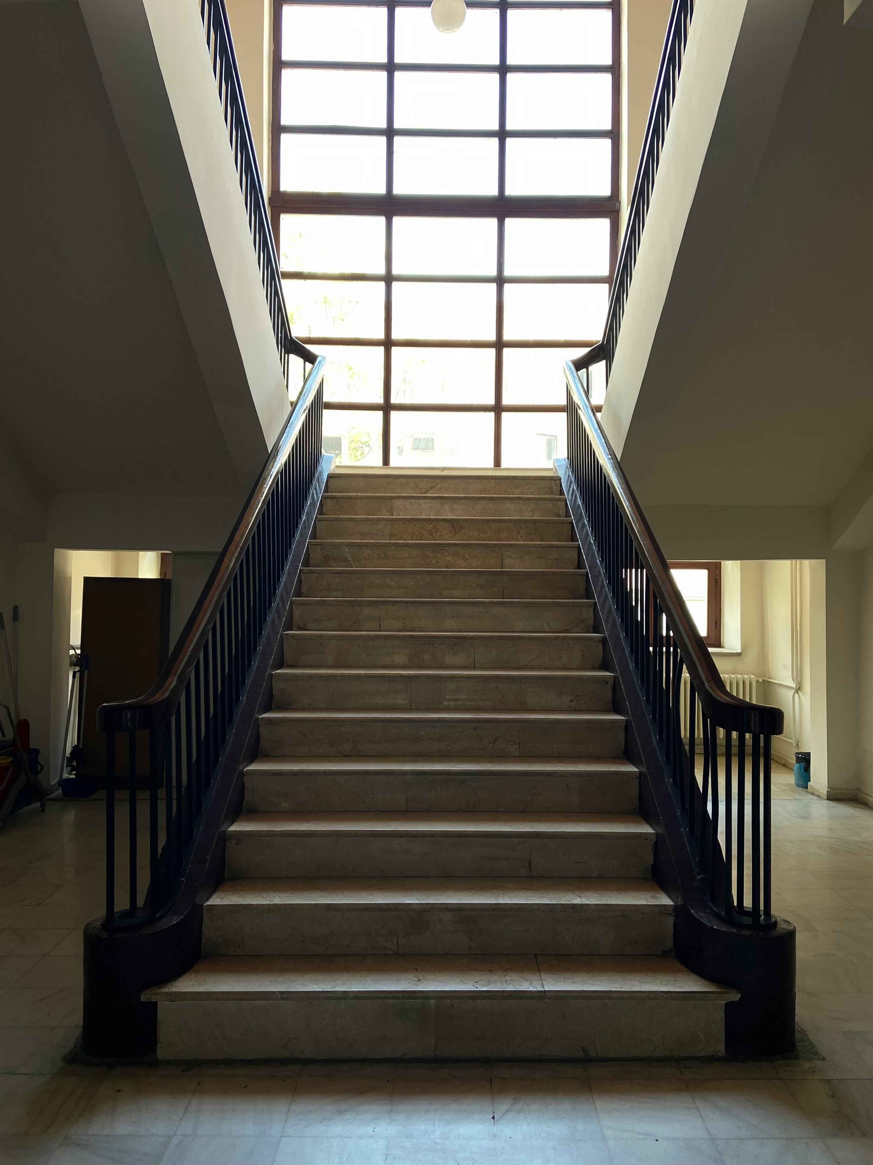 Bifurcated Half-turn Marble Staircase with Wooden Handrail · Free Stock ...