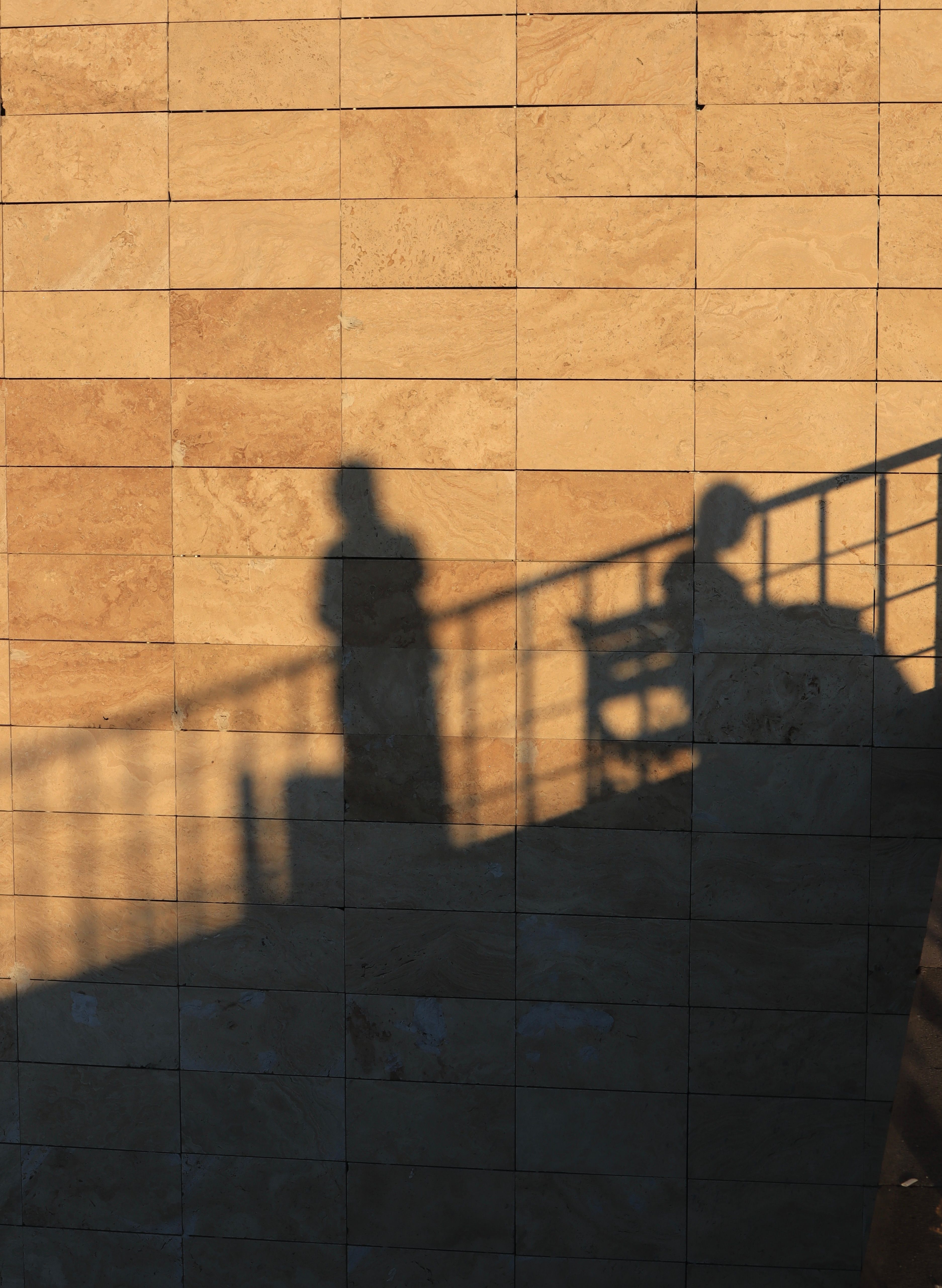 Shadows of People on the Wall in City · Free Stock Photo