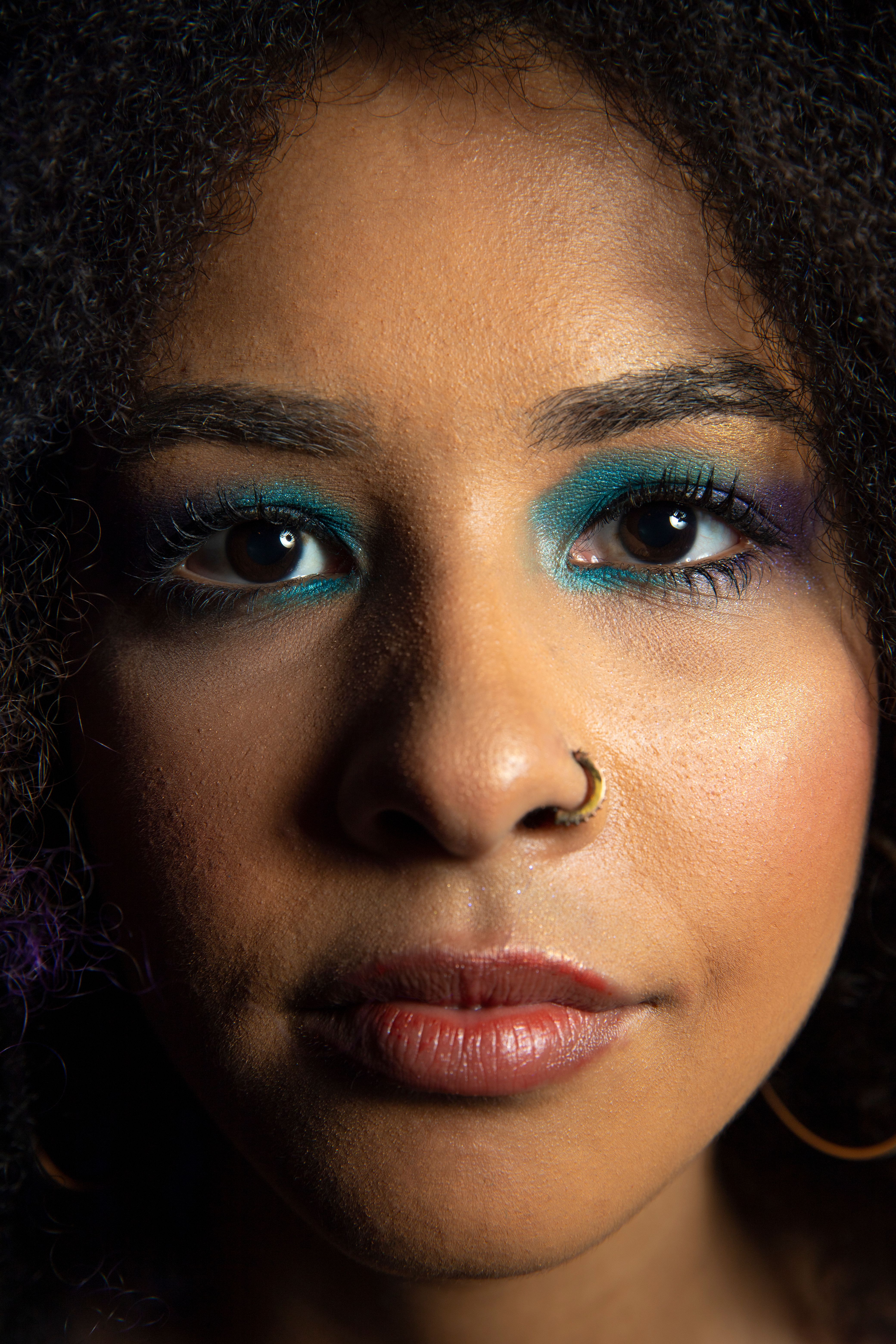 Face of a Young Woman Wearing a Nose Ring · Free Stock Photo