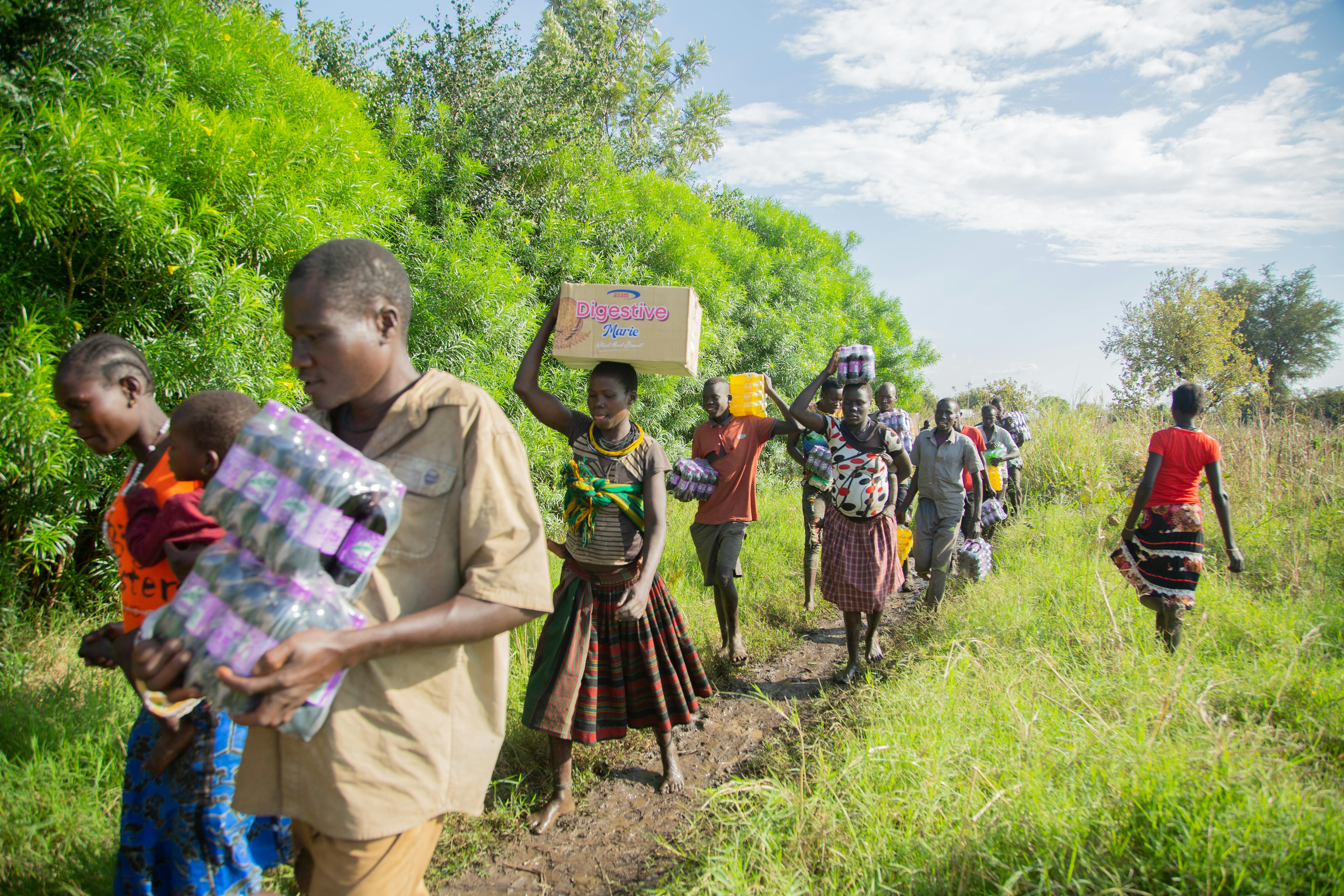 Group of People Carrying Groceries · Free Stock Photo