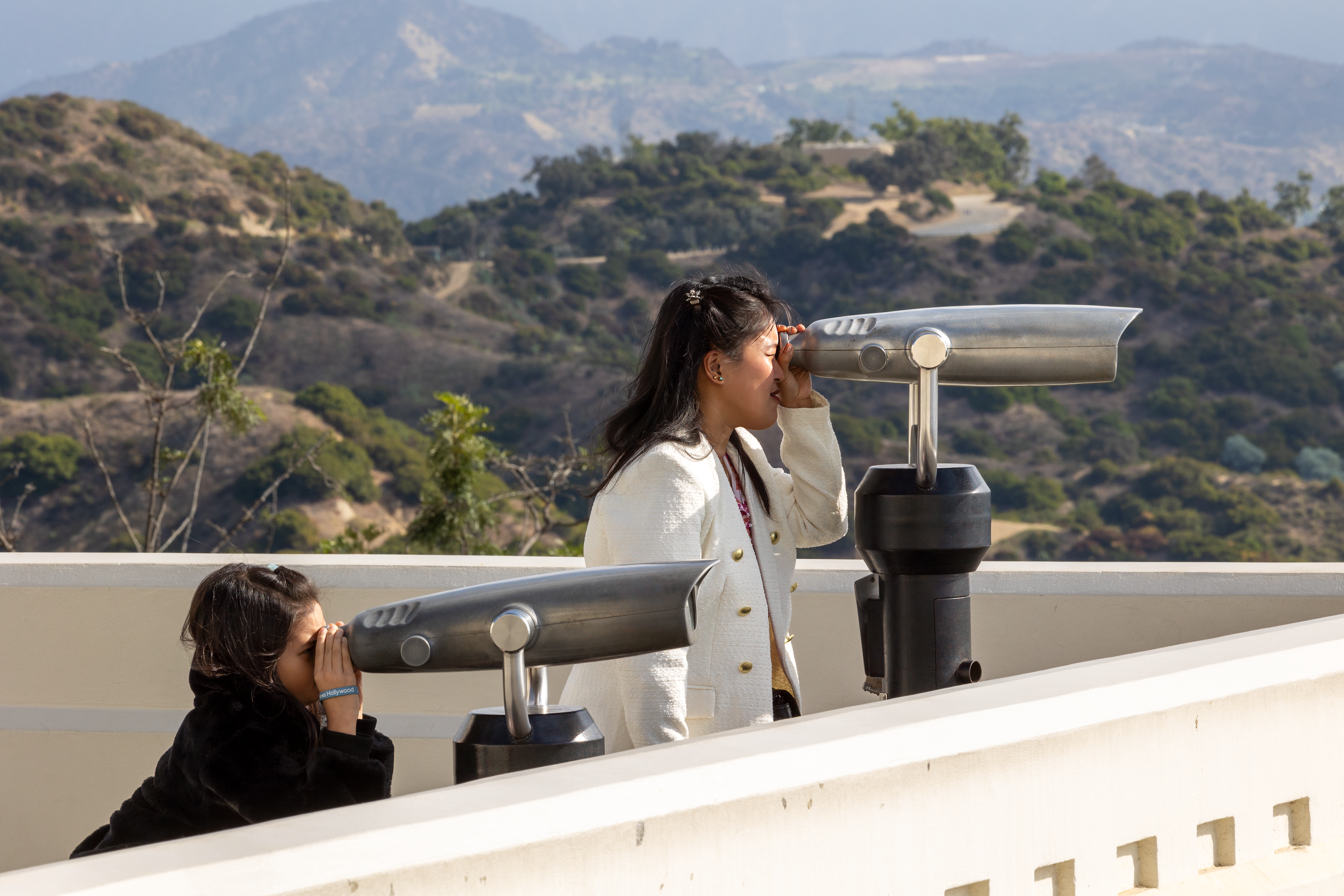 Women Looking Through a Telescope · Free Stock Photo