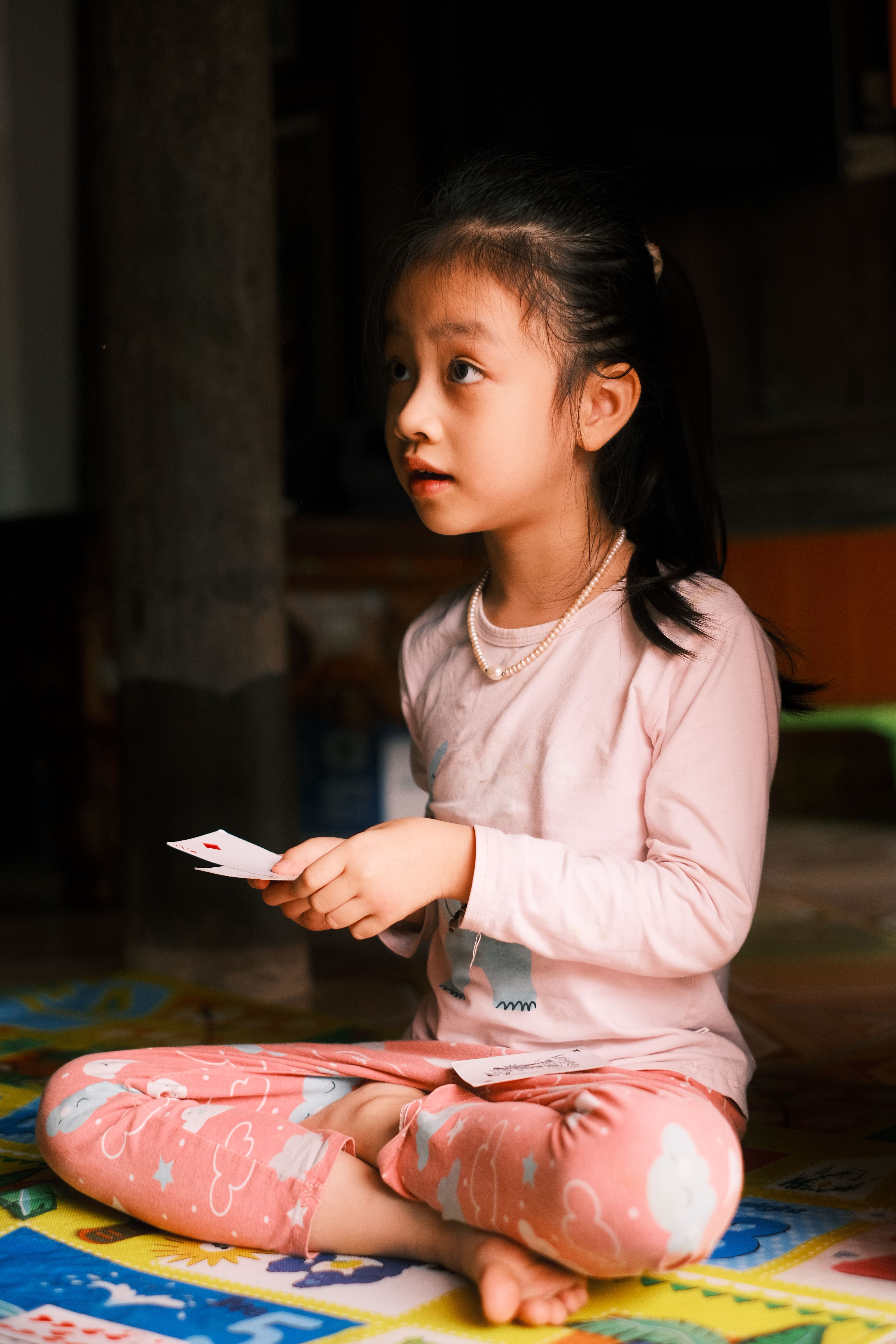 A Child Playing Cards · Free Stock Photo