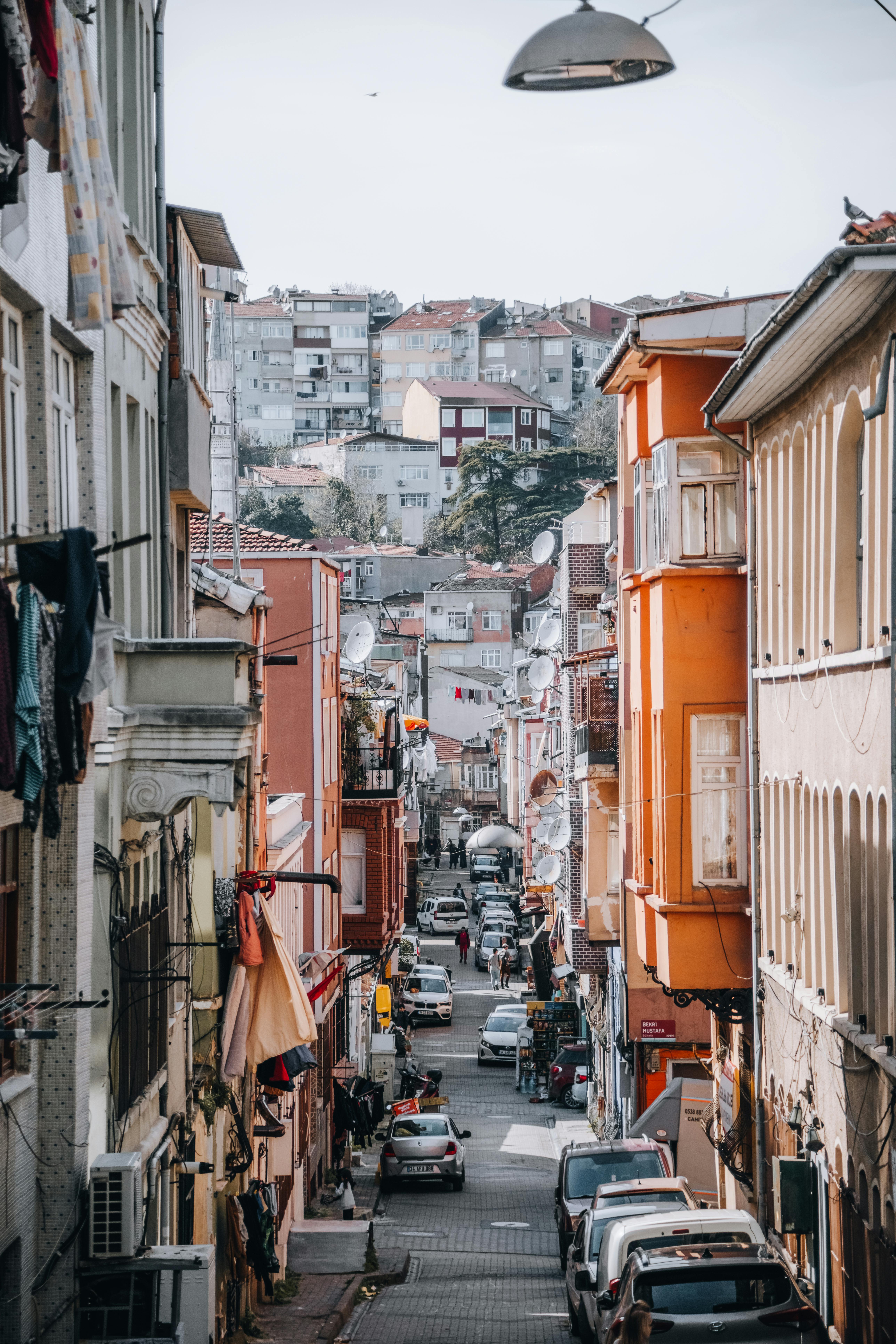View of a Busy Narrow Alley between Residential Buildings in City ...