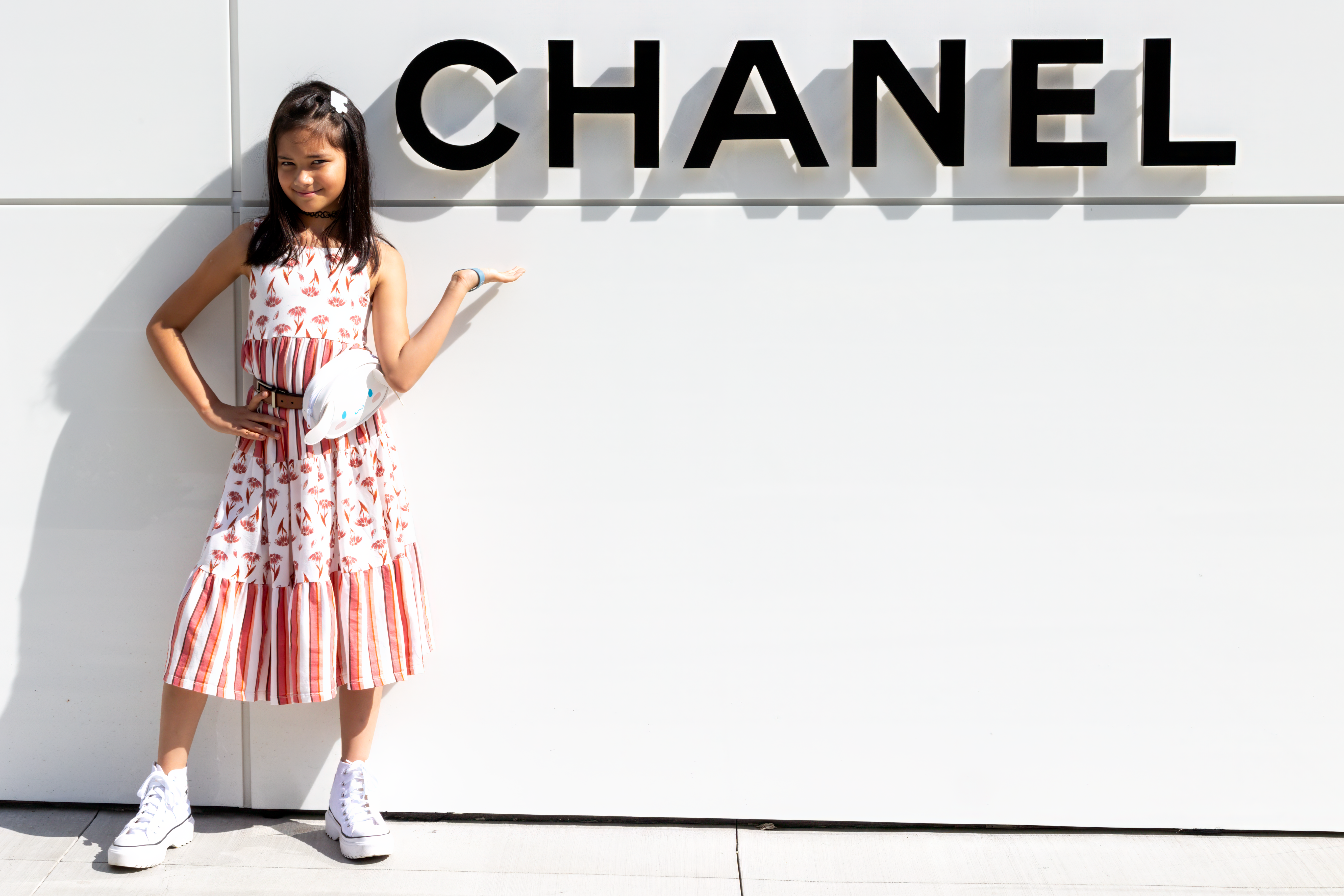 Little Girl in Front of Chanel Store · Free Stock Photo