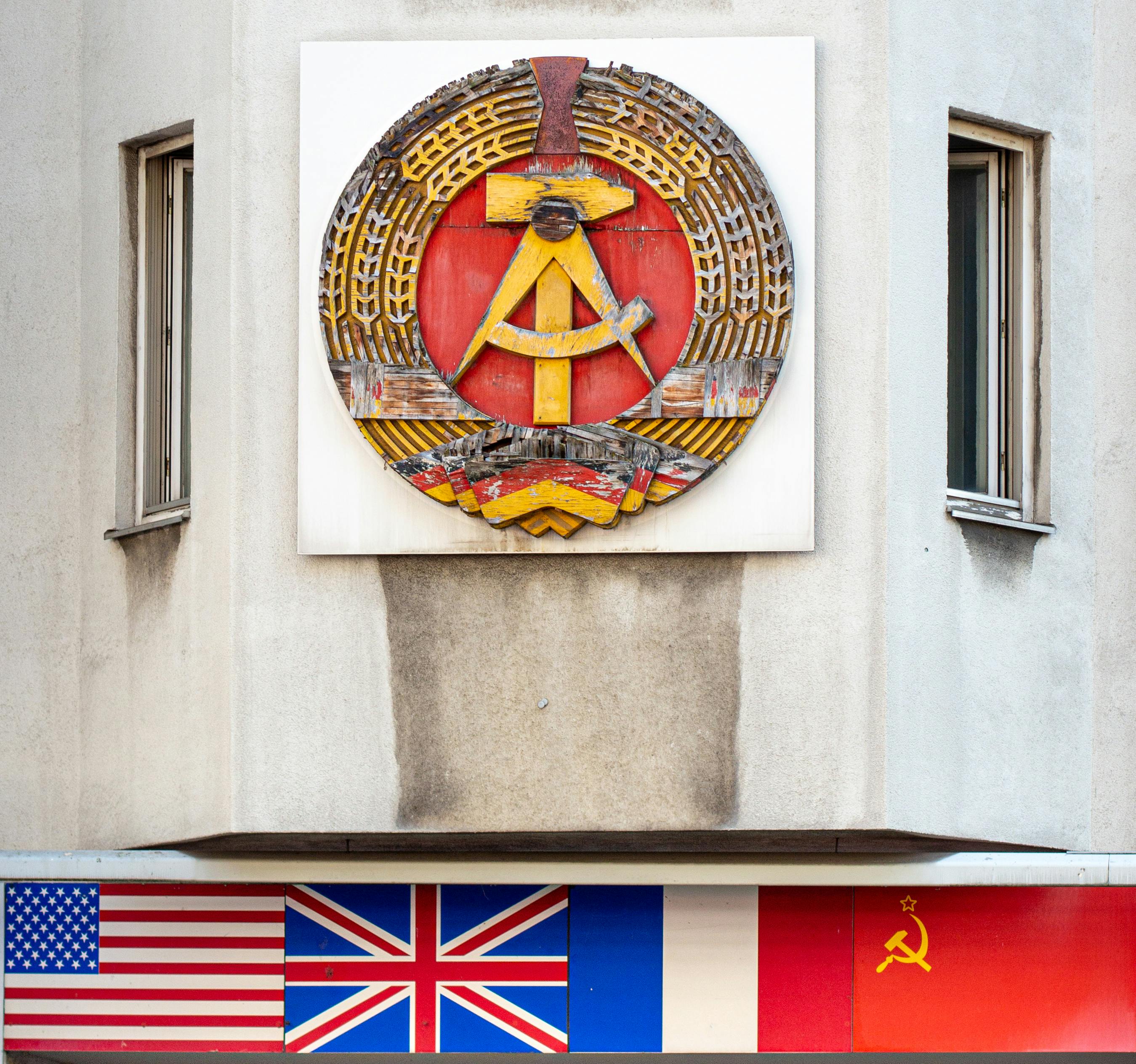 National Emblem of East Germany at Checkpoint Charlie in Berlin ...